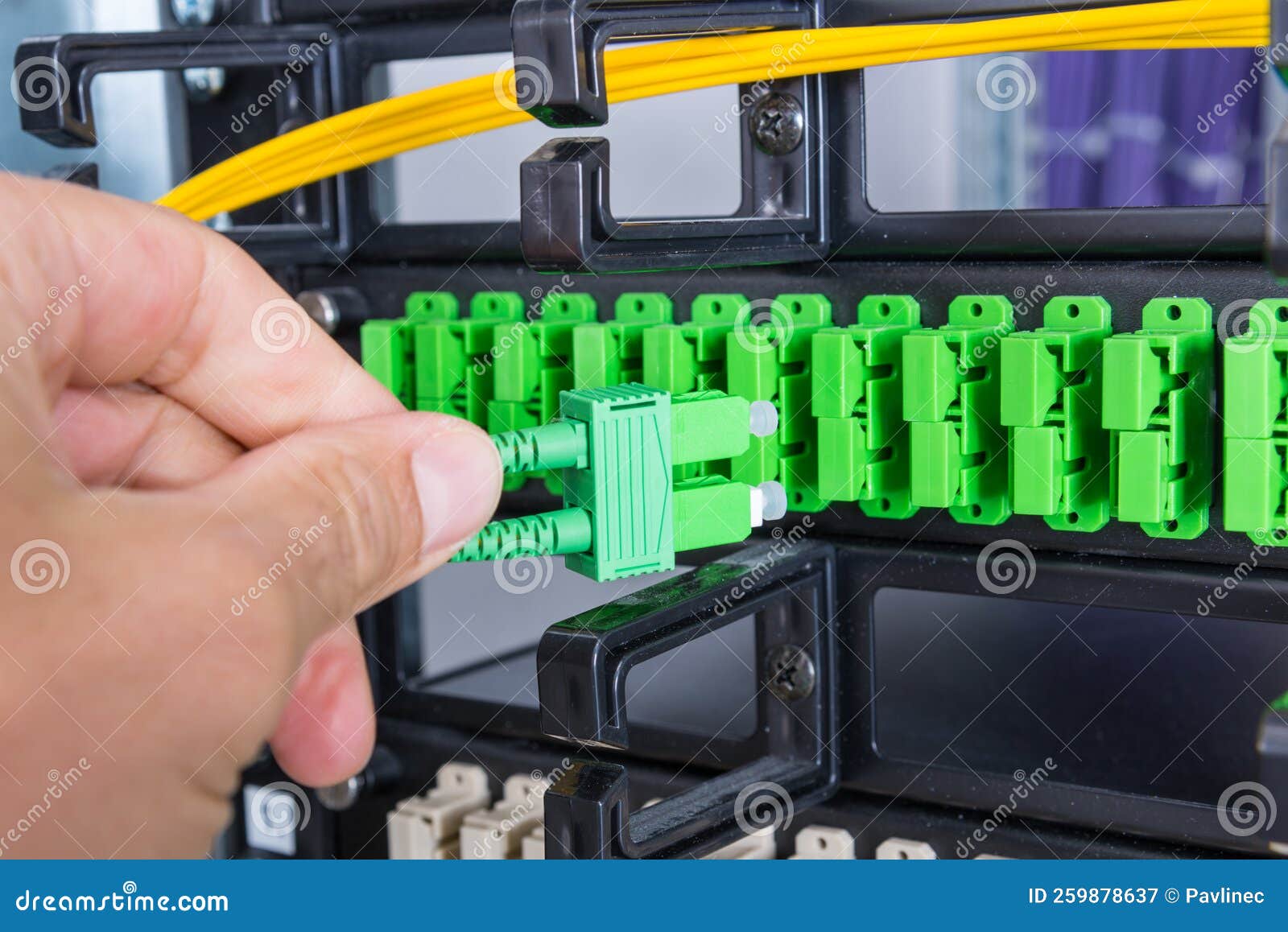 Hand of Computer Engineer Connecting Fiber Optic Cable in Server Stock ...