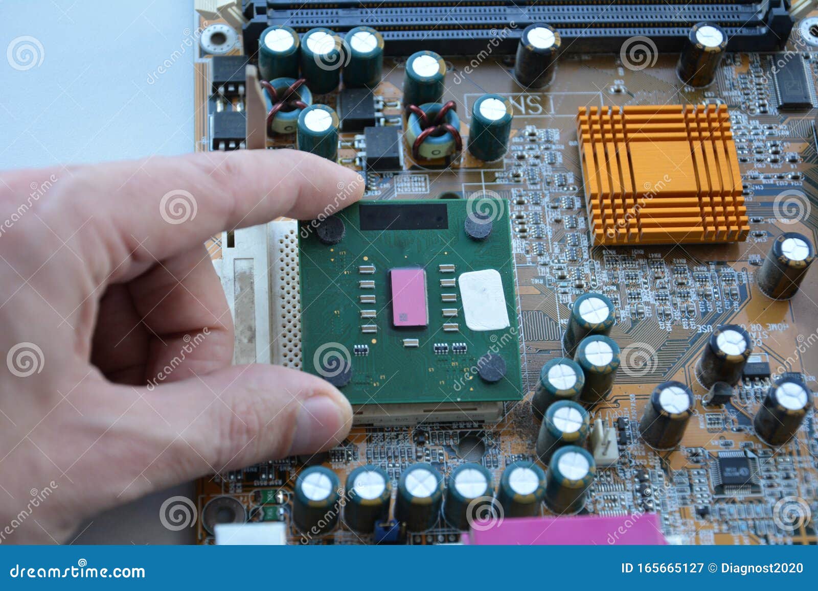 Hand of Computer Engineering Plugging Computer Cpu Processor Memory Change Components into ...