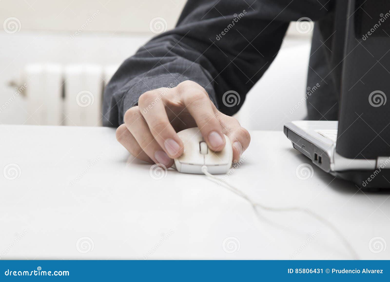 Hand on the computer mouse stock image. Image of desk - 85806431