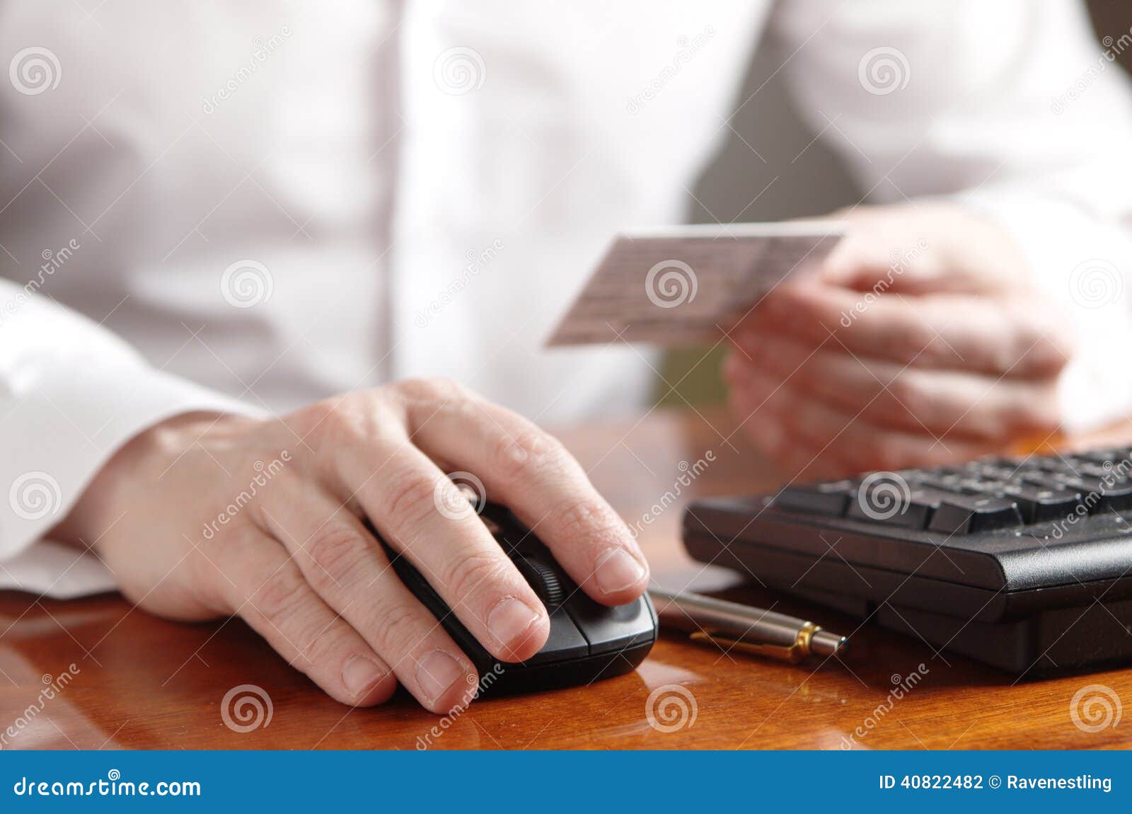 Hand on Computer Mouse Next To the Keyboard Stock Photo - Image of ...