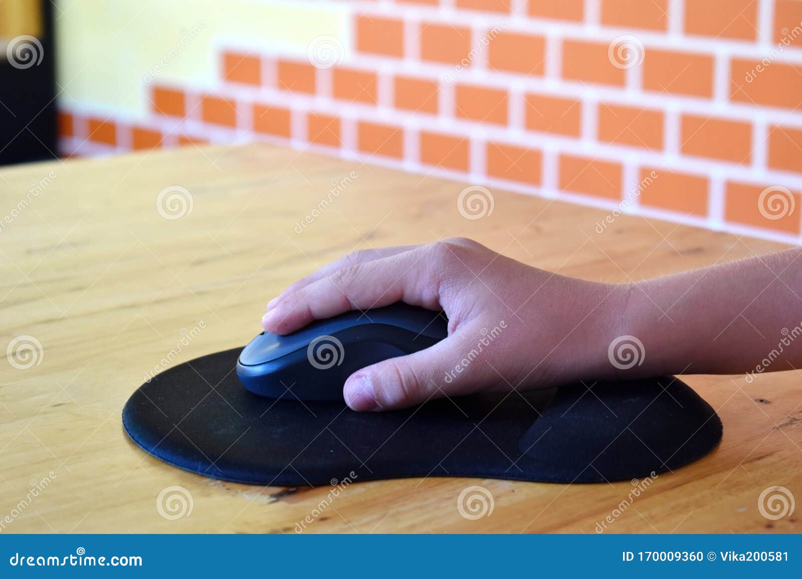 Hand Controls a Computer Mouse. Pad for Computer Mouse. Stock Photo ...