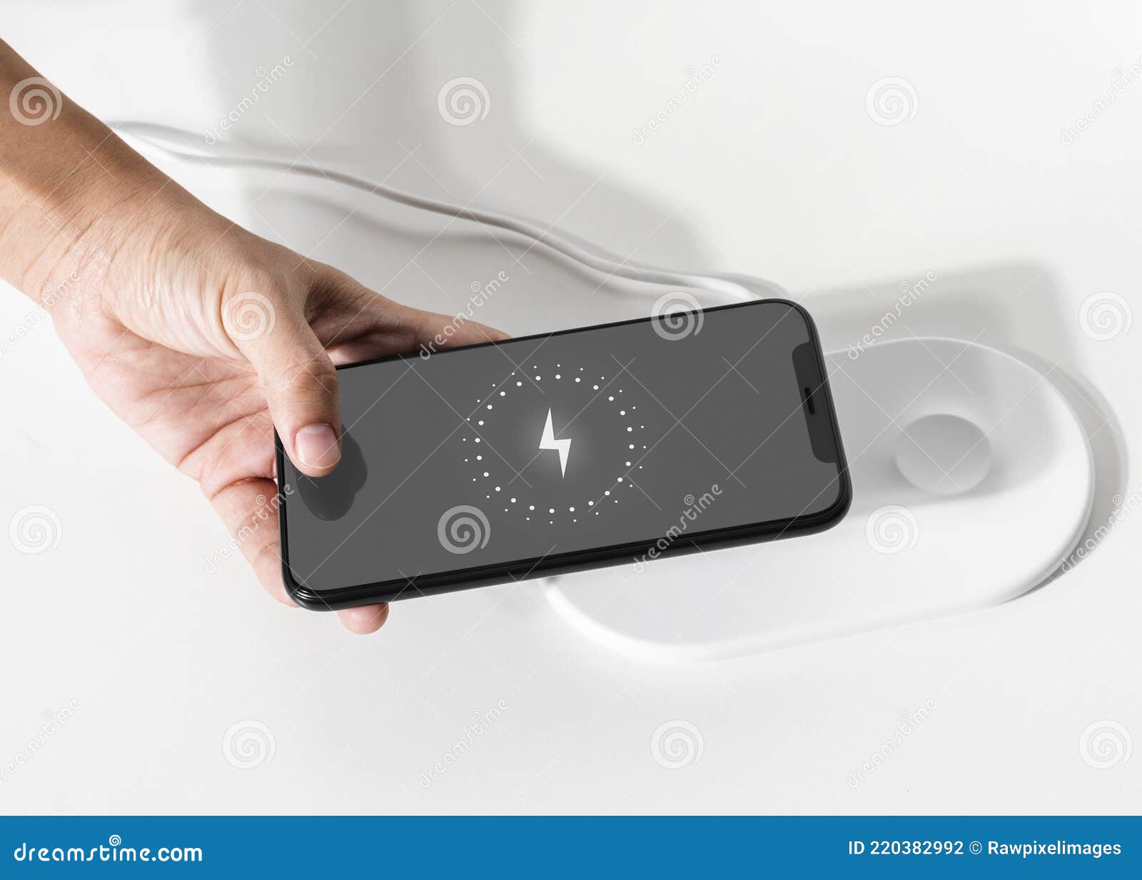 Hand Connecting Smartphone To Wireless Charger Stock Photo - Image of ...