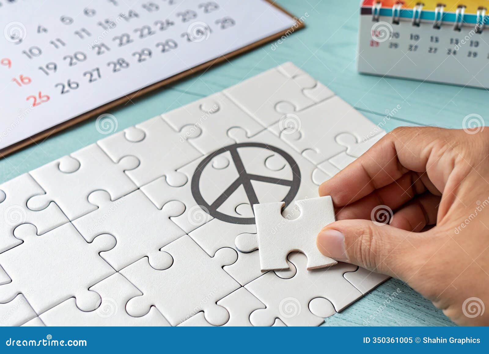 Hand Connects Puzzles of Sign of Peace. World Day of Peace Stock ...