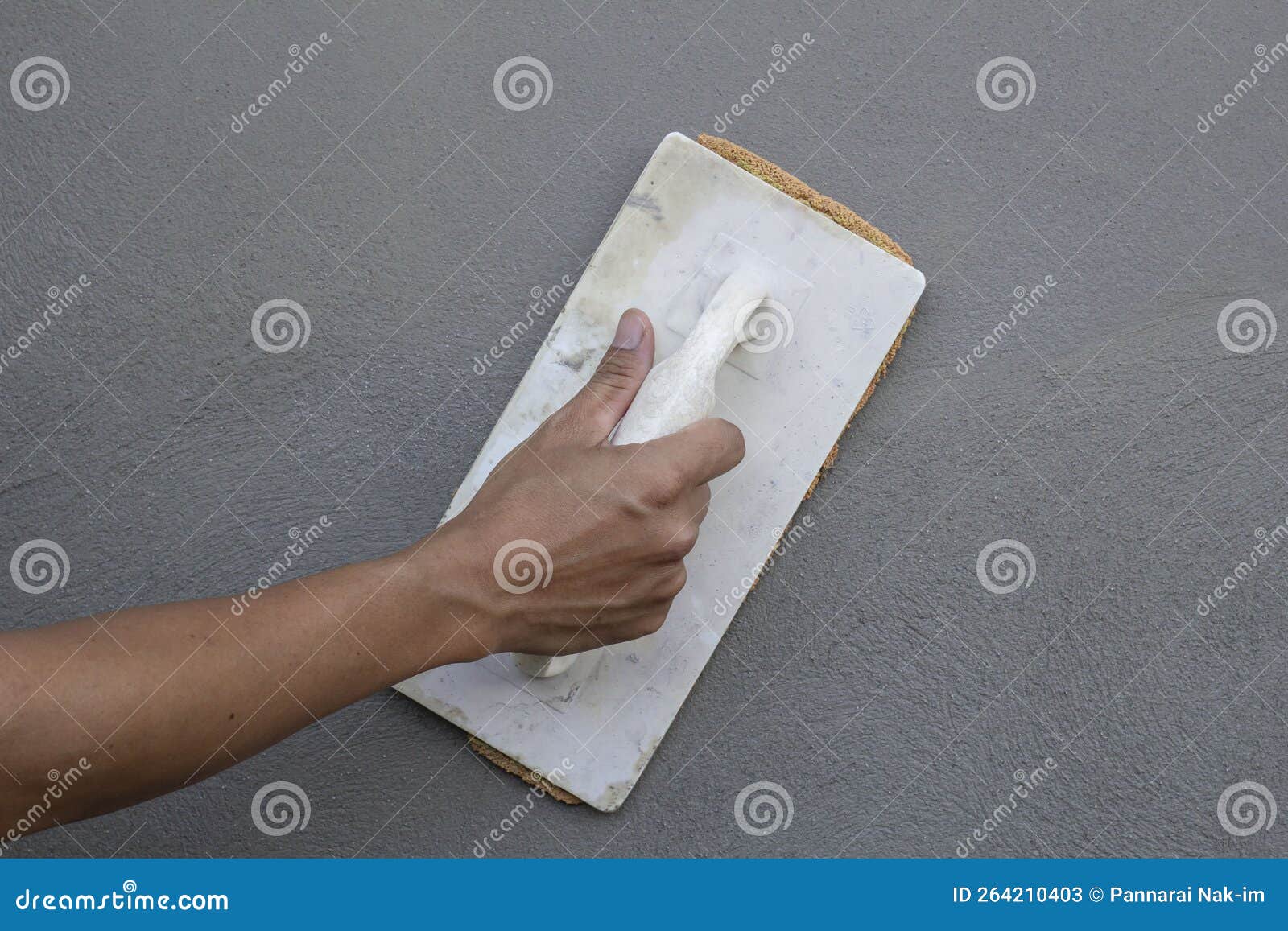 Hand of Construction Worker Holding Plastering Trowel and Sponge for ...