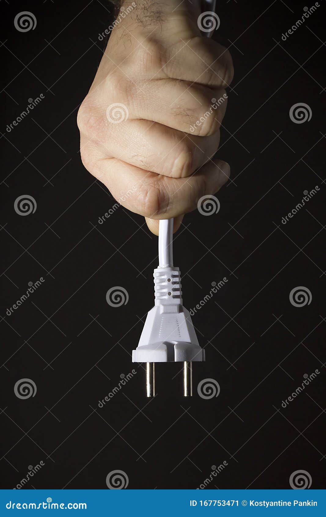 Hand with cord and plug stock image. Image of electricity - 167753471