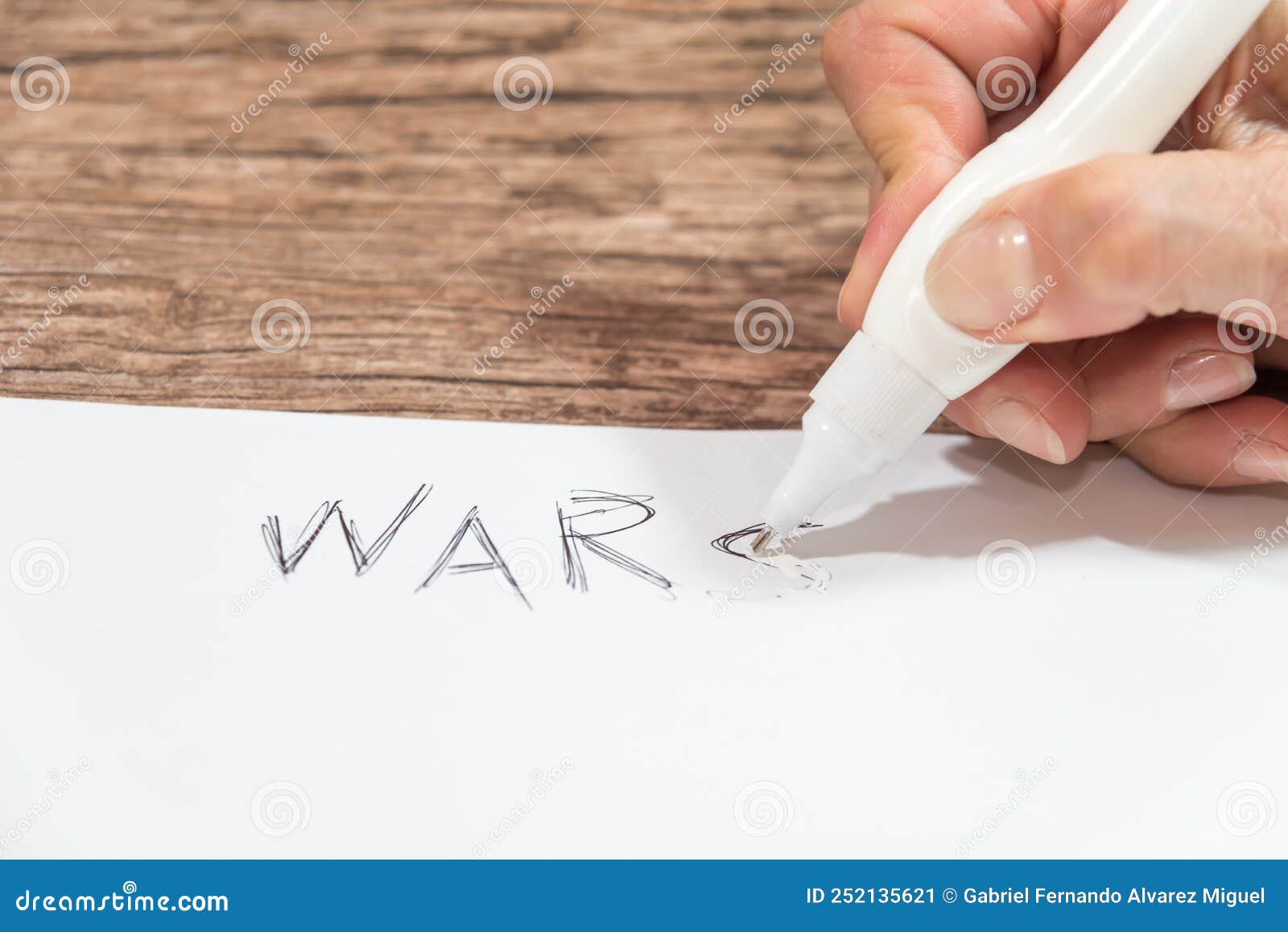 Hand Correcting Writings of a Notebook with Liquid Paper Stock Image ...