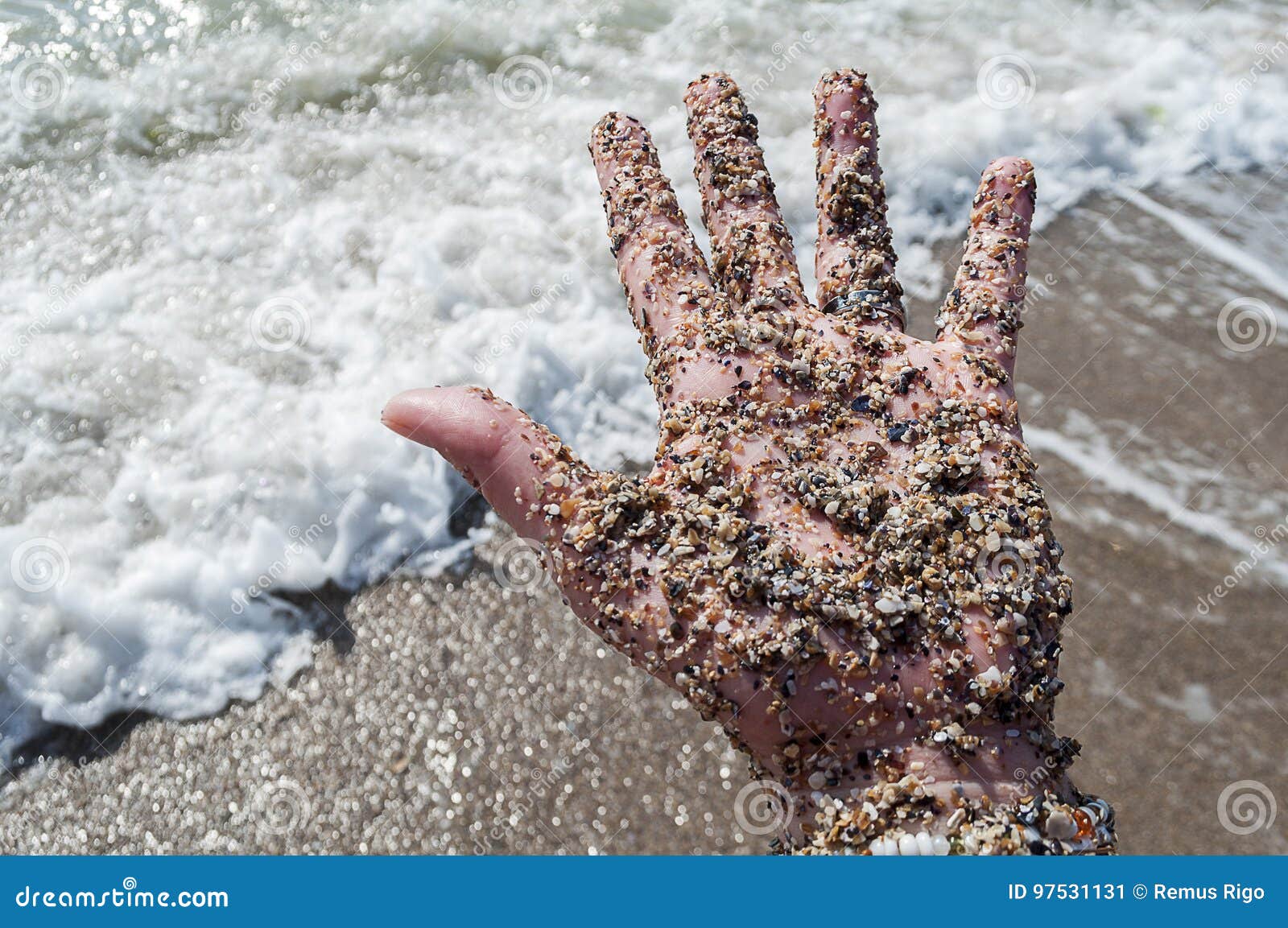 Hand covered with sand stock image. Image of romania - 97531131