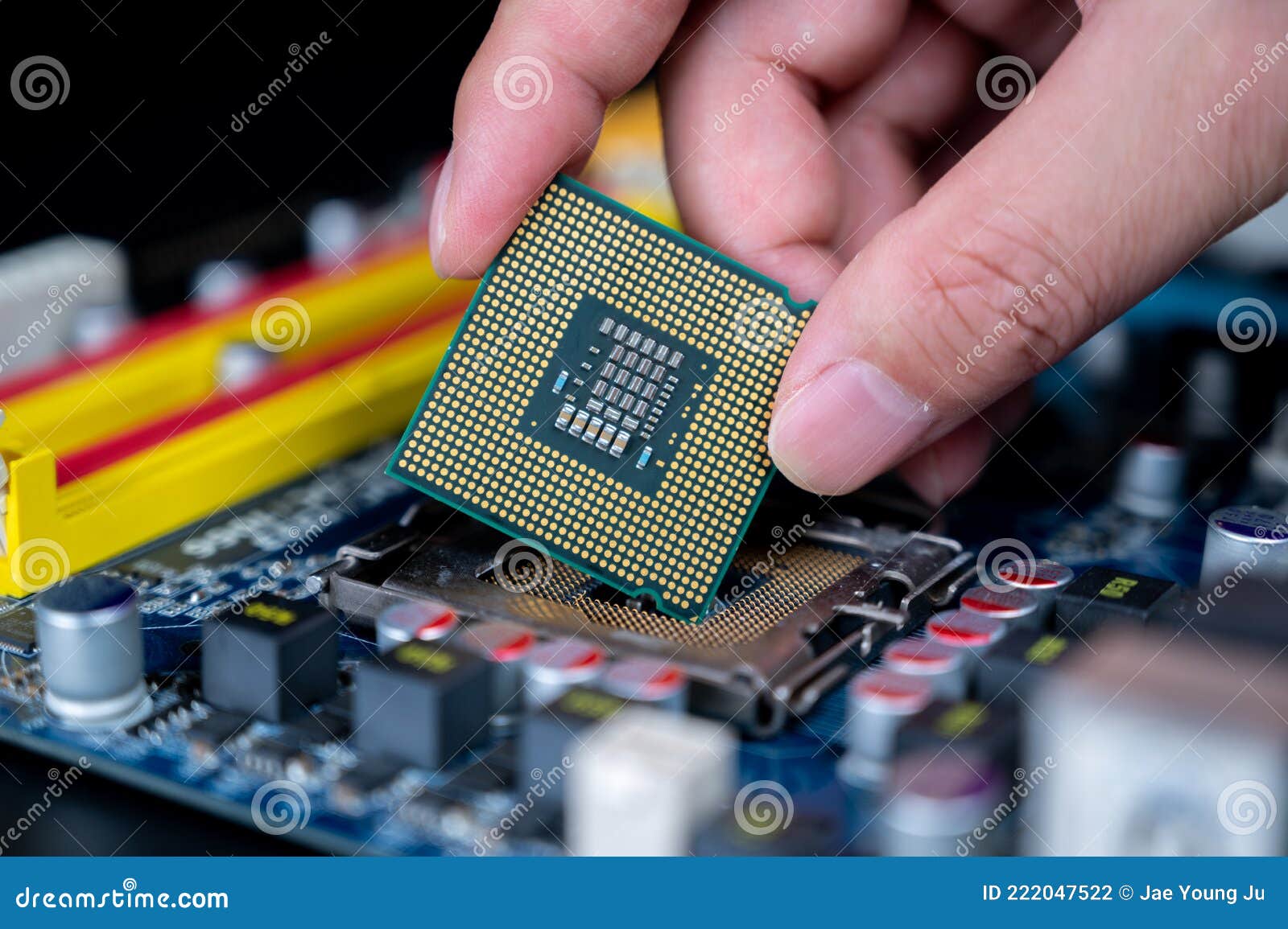 Hand with CPU on a Computer Motherboard Stock Photo - Image of ...