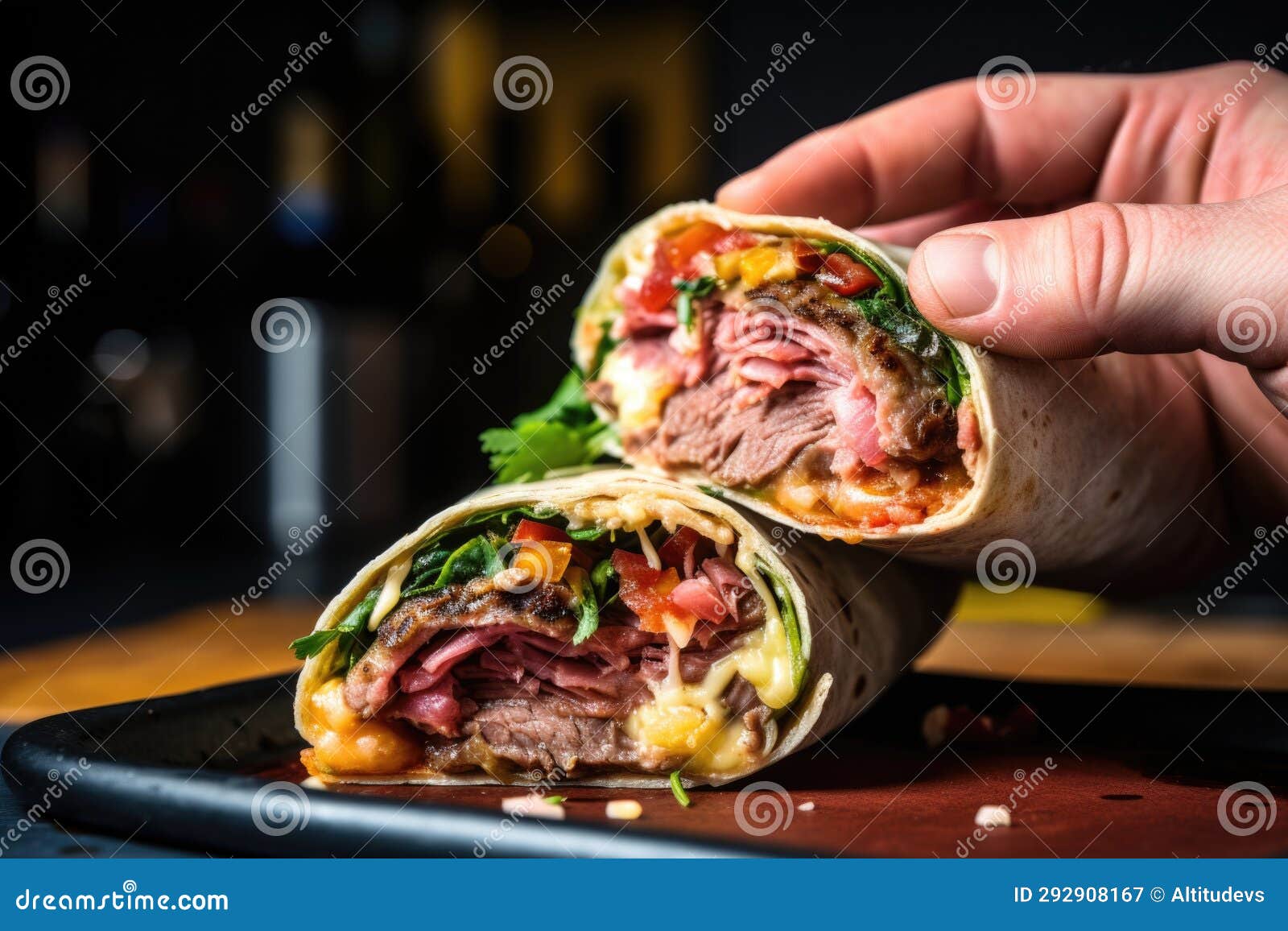 Hand Cracking Open a Hard Shell Beef Burrito Stock Image - Image of ...