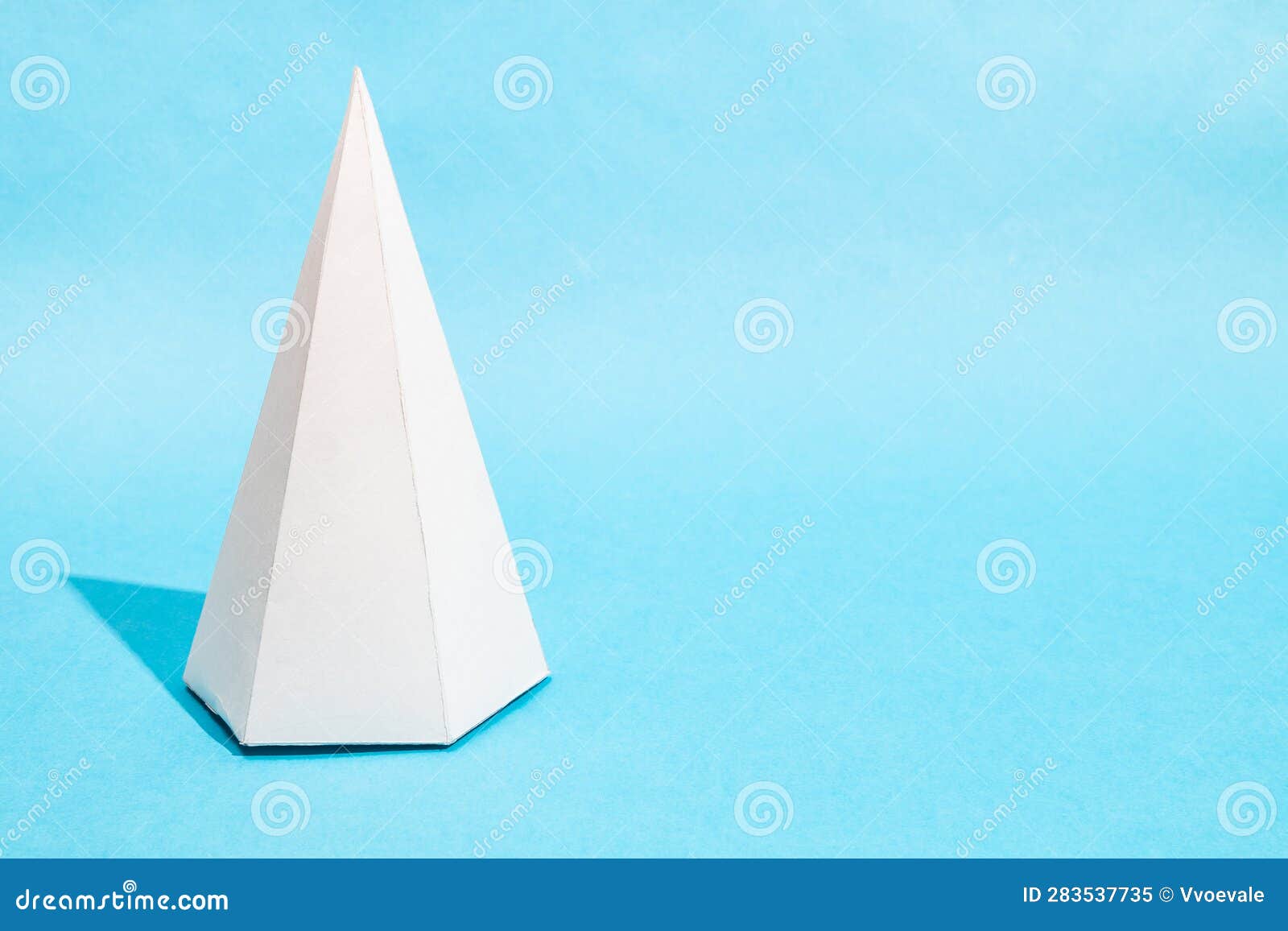 Hand-crafted Paper Six-sided Pyramid on Turquoise Stock Image - Image ...