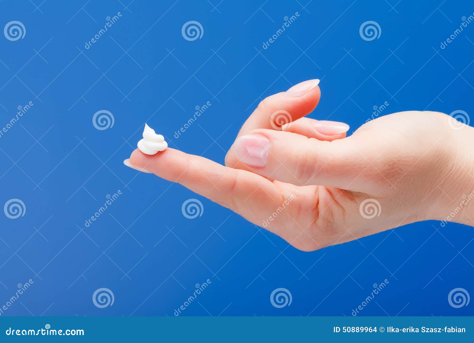 Hand cream on woman finger stock photo. Image of concepts - 50889964