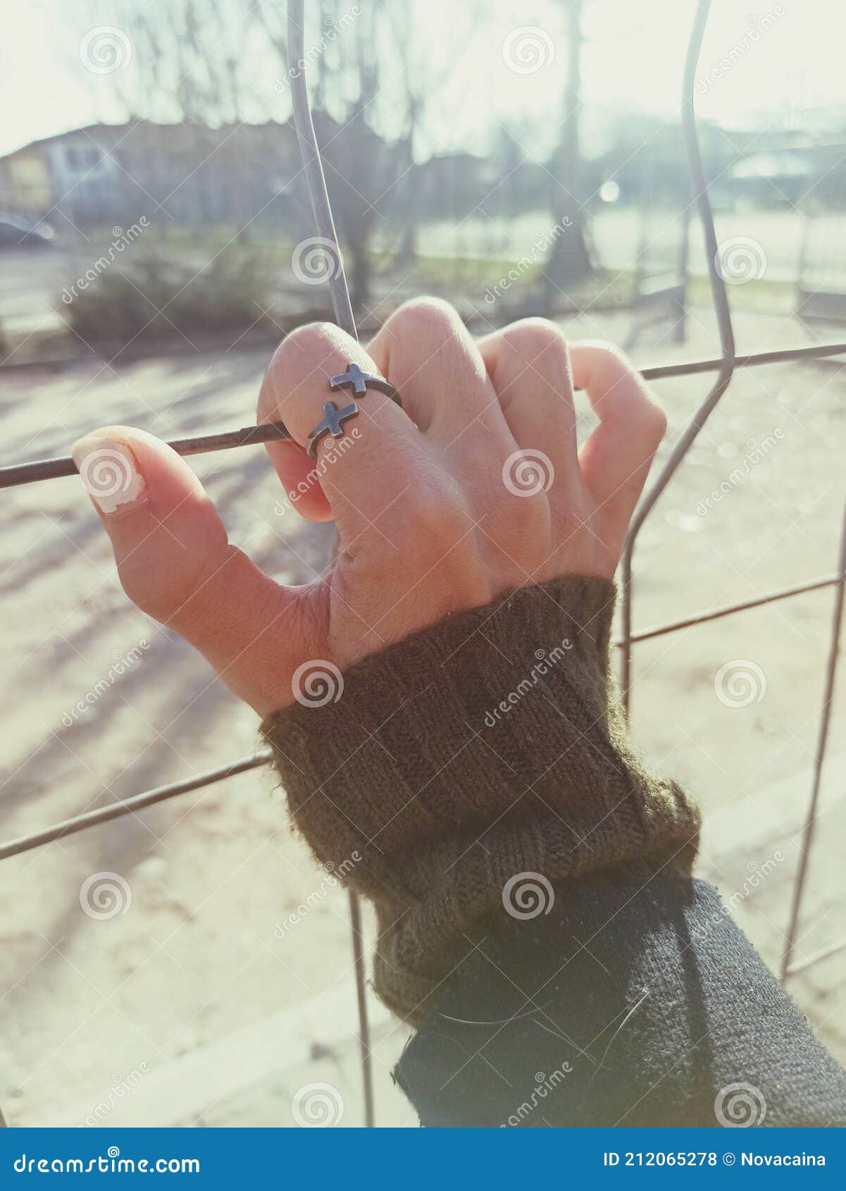 Hand with Cross Ring on Sunlight Stock Photo - Image of freedo, cross ...