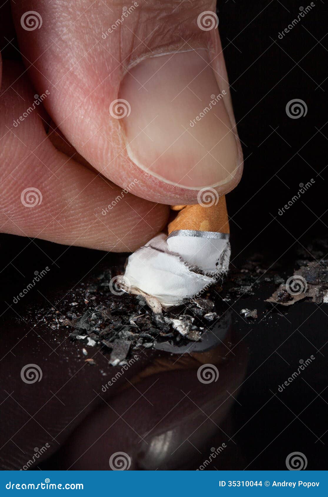 Hand Crushing a Cigarette stock photo. Image of addiction - 35310044