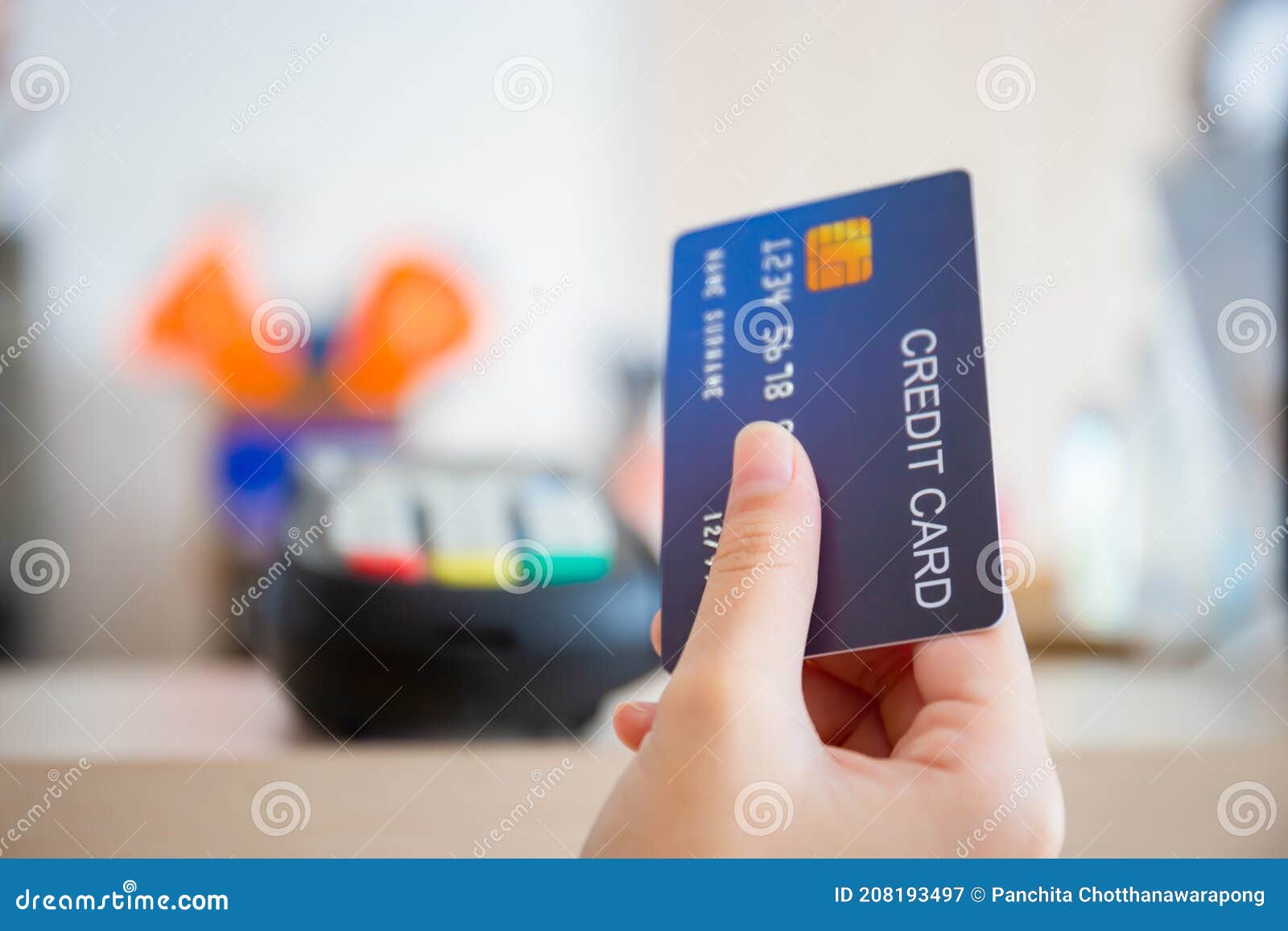 Hand of Customer with Credit Card Blurred Credit Card Reader Machine at ...