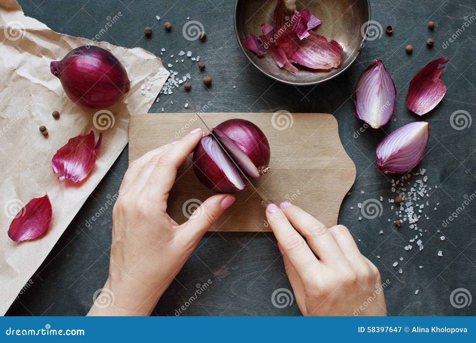 Hand cut red onion stock image. Image of salt, hand, view - 58397647