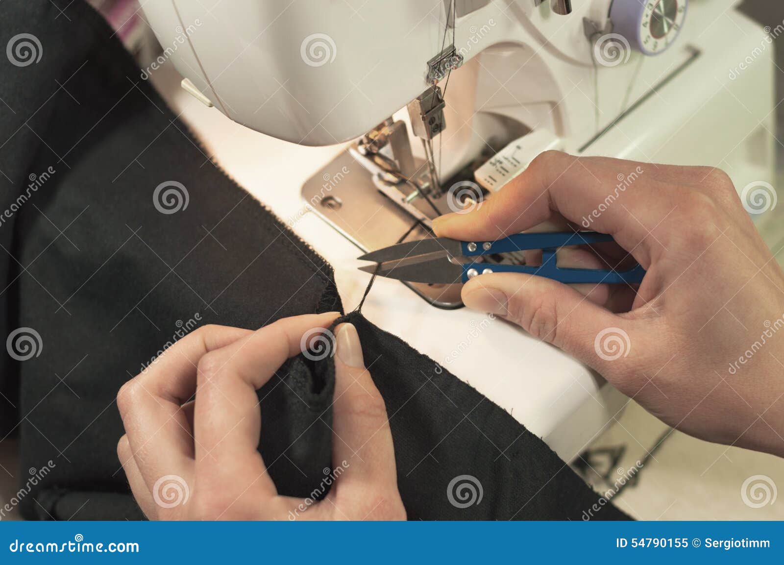Hand Cut Thread after Processing Tissue Serger. Stock Image - Image of ...