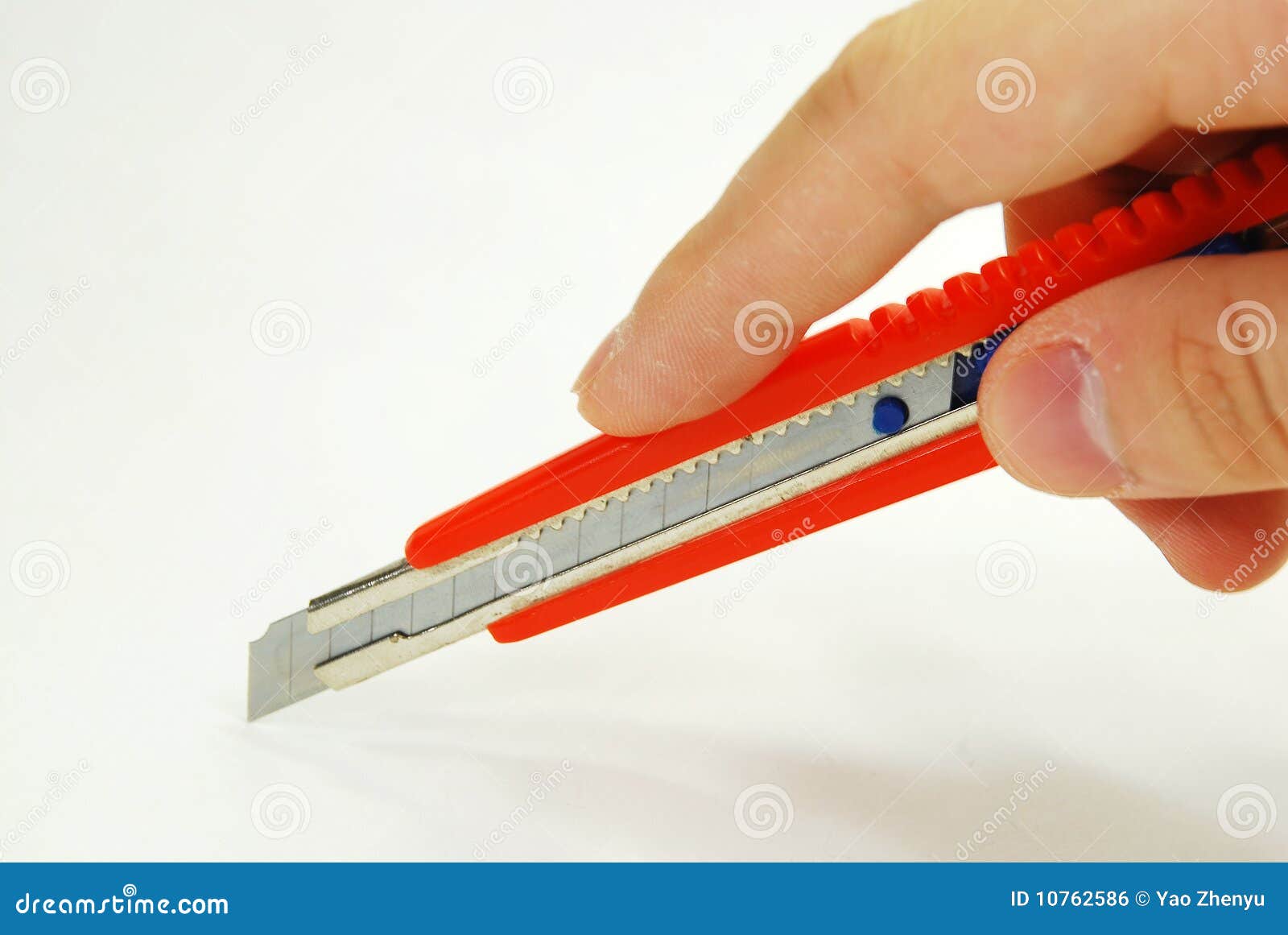 Hand with cutter stock photo. Image of blade, steel, isolated - 10762586