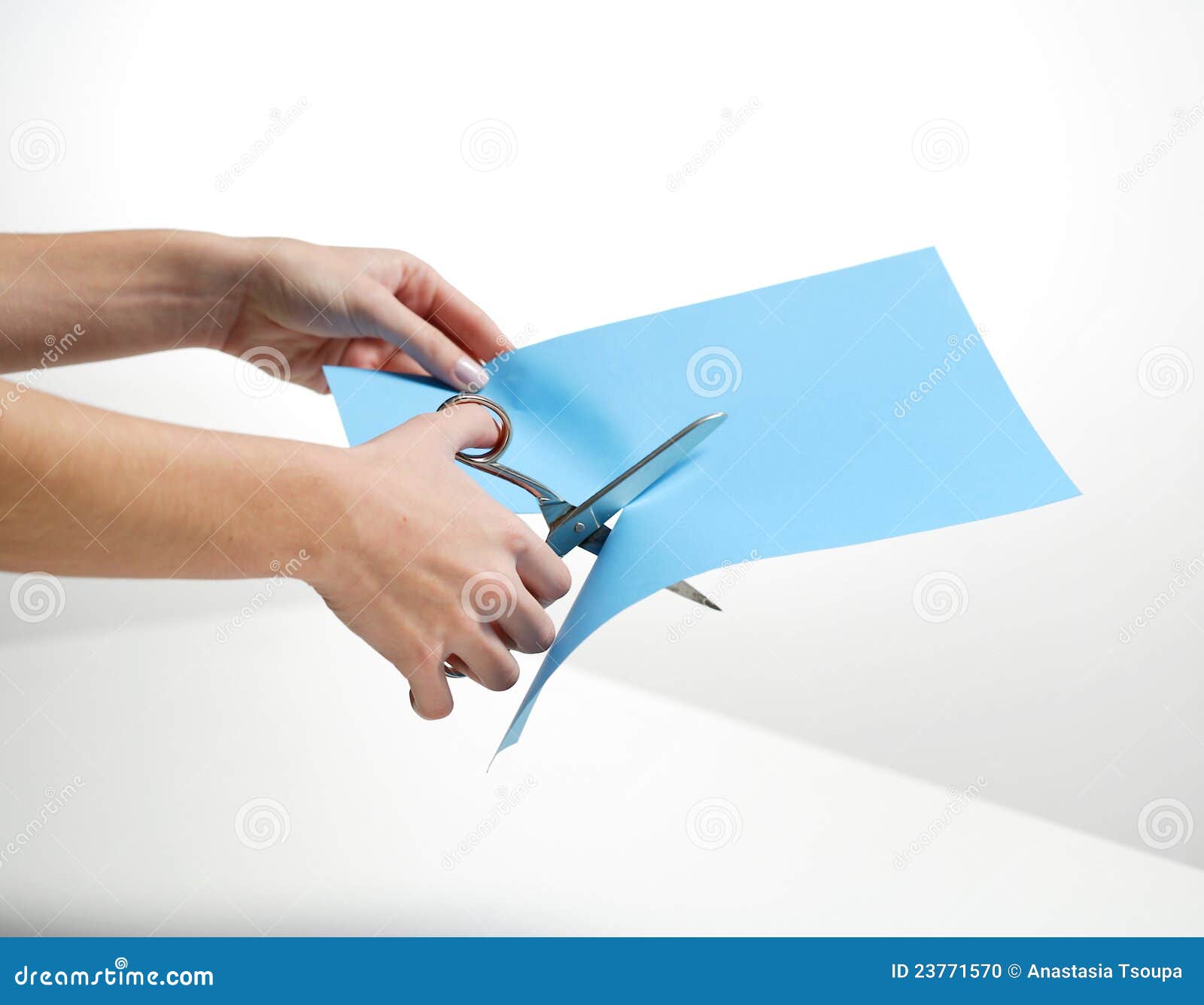 Hand cutting paper stock photo. Image of craft, gesture - 23771570