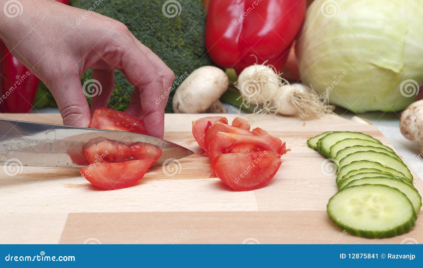 Hand cutting vegetables stock image. Image of chopping - 12875841