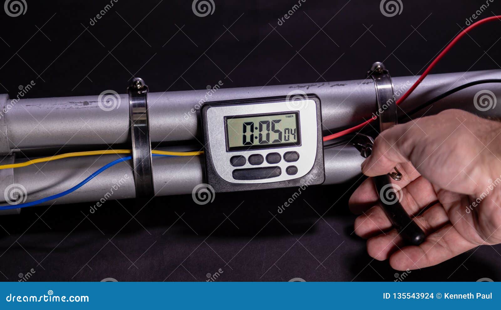 Hand Cutting Wire on Pipe Bomb Stock Photo - Image of cutting, security ...