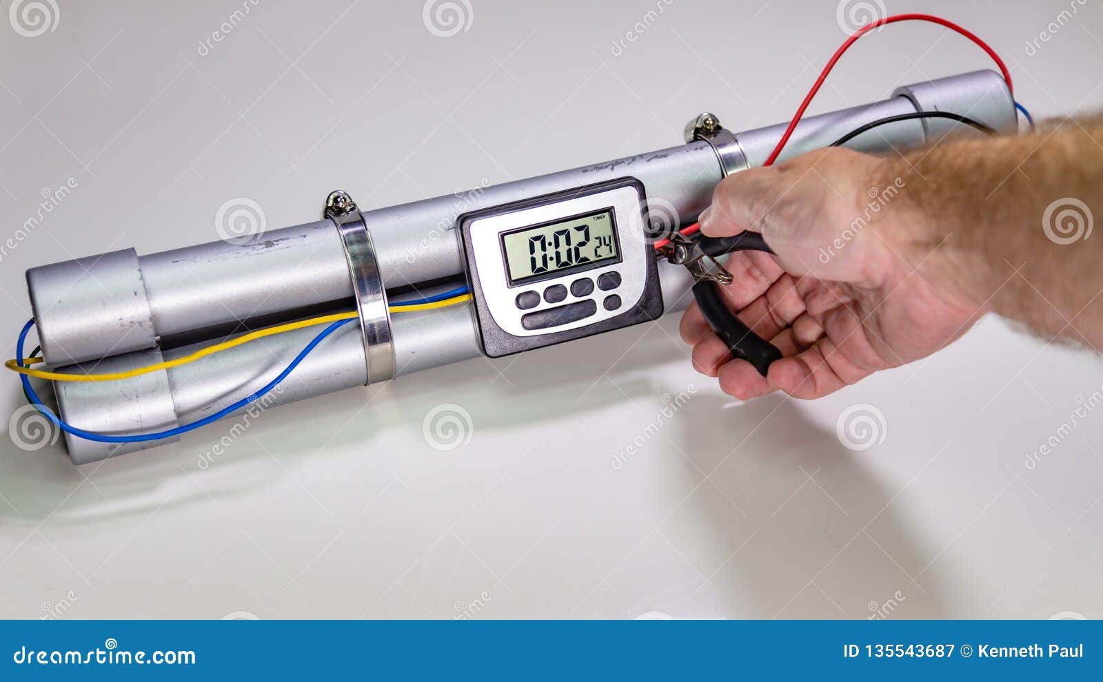 Hand Cutting Wire on Pipe Bomb on White Background Stock Image - Image ...