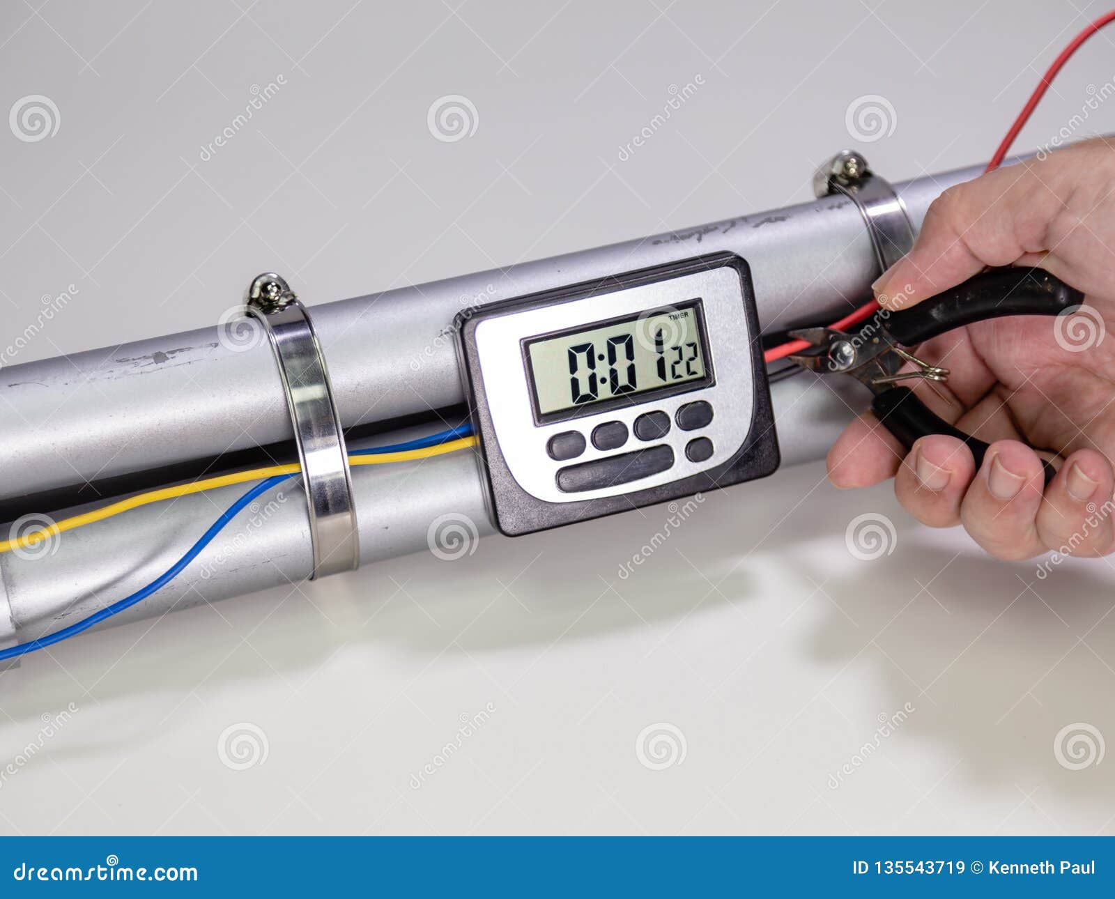 Hand Cutting Wire on Pipe Bomb on White Background Editorial Stock ...