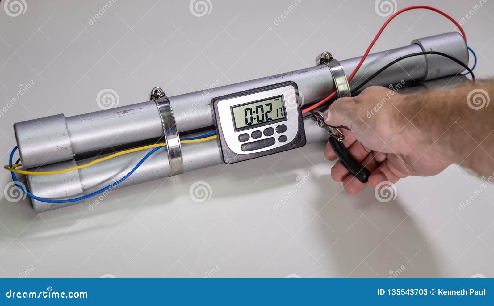 Hand Cutting Wire on Pipe Bomb on White Background Editorial Stock ...