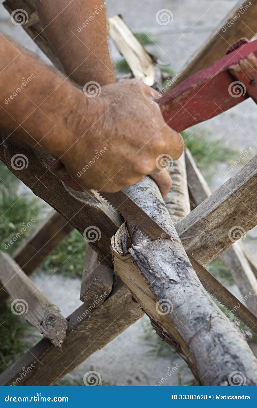 Hand cutting wood stock photo. Image of holding, handyman - 33303628
