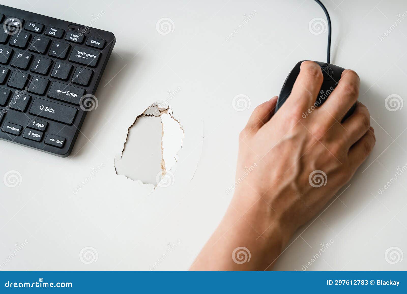 Hand and Damaged Desk with Hole Inside. Concept of Stressful Work Stock ...