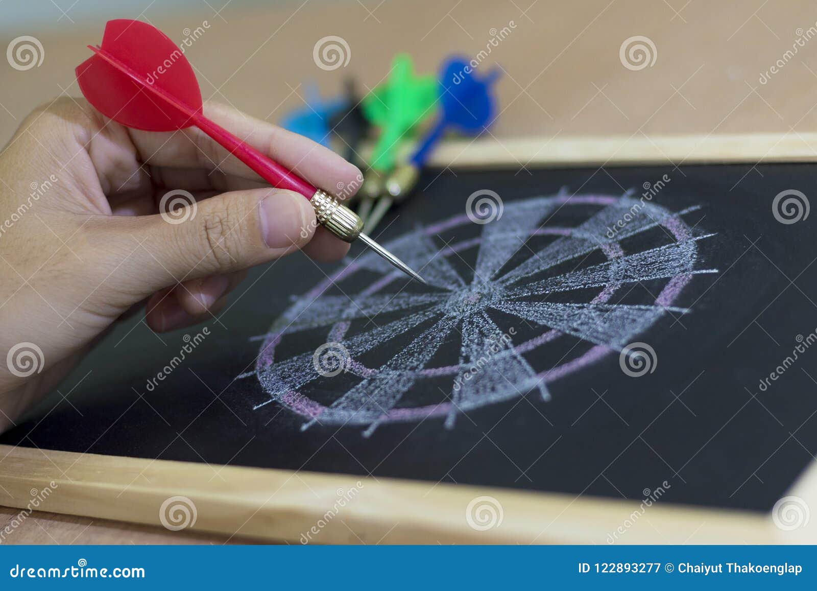 Hand with a Dart is Aiming at a Dartboard Stock Image - Image of dart ... Hand with a Dart is Aiming at a Dartboard Stock Image - Image of dart ...