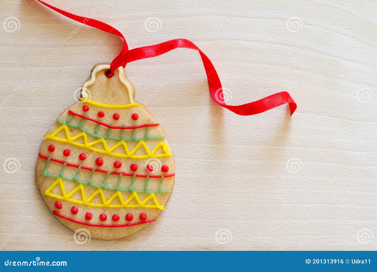 Hand Decorated Cookie in Shape of Bauble on Kitchen Board, Christmas ...