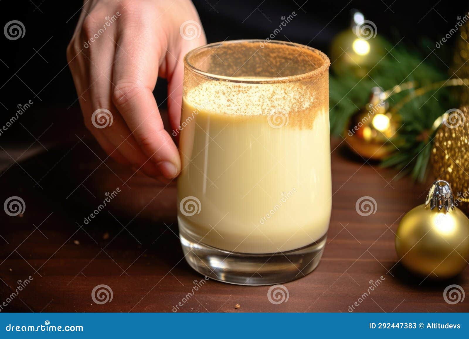 Hand Decorating the Rim of an Eggnog Glass with a Sugar Crust Stock ...