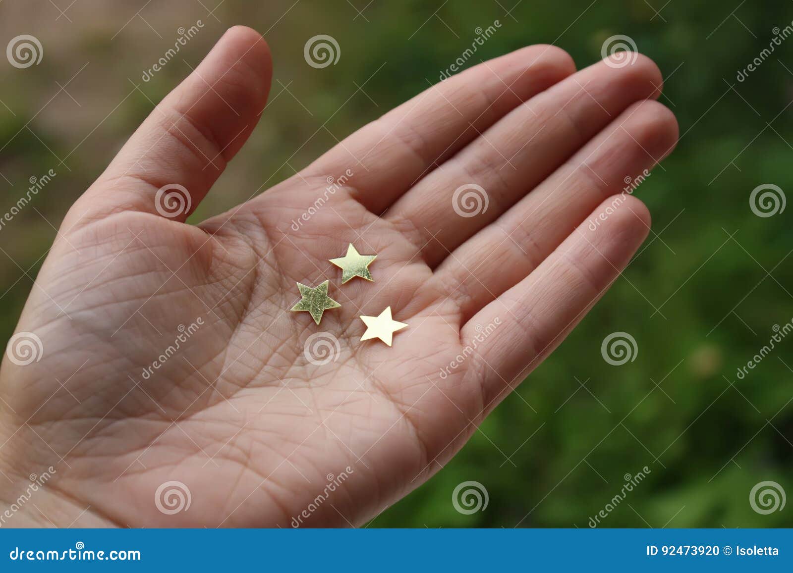 Hand with Decorative Golden Paper Stars Stock Photo - Image of palm ...