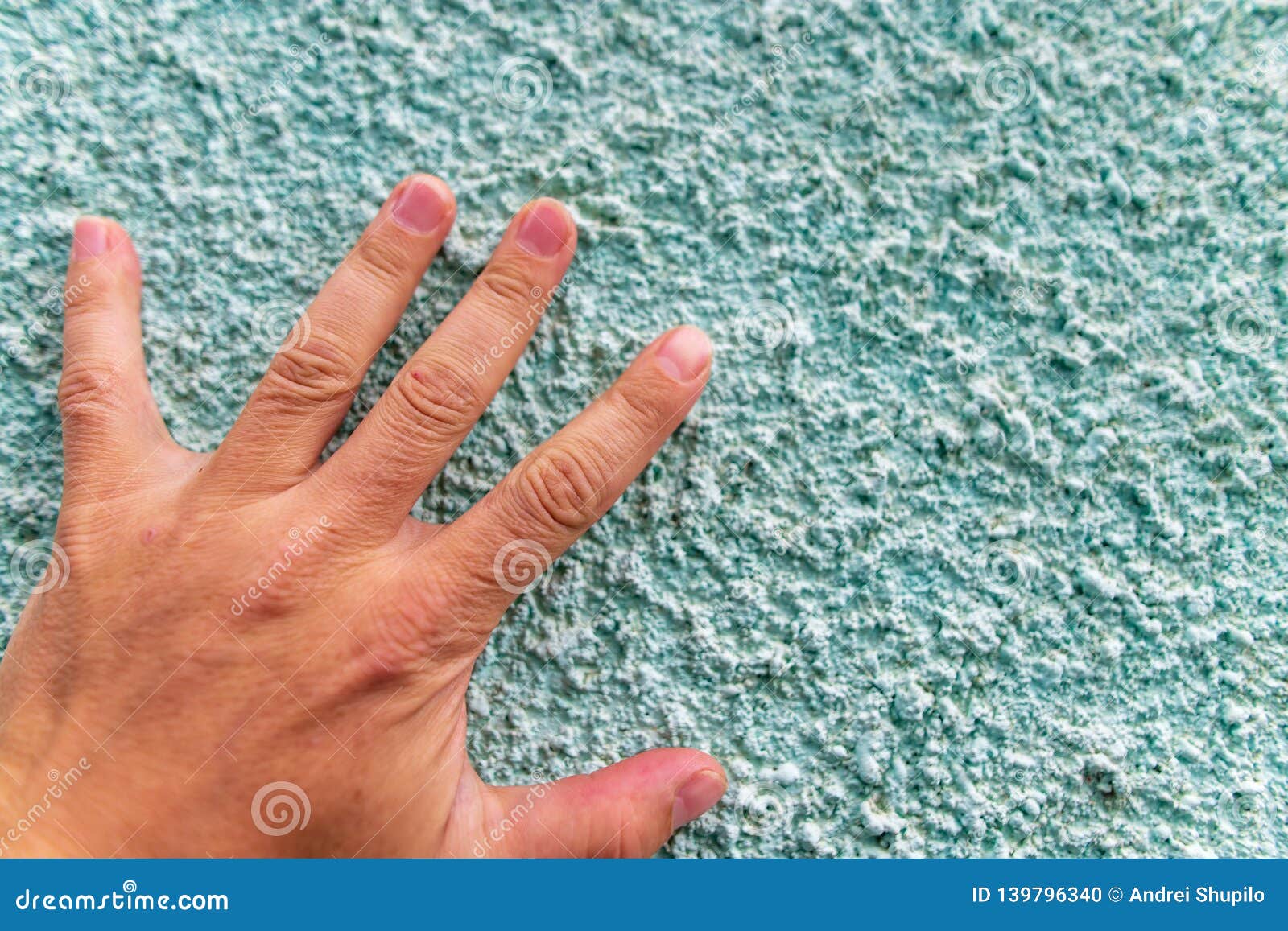 Hand on Decorative Plaster on the Wall Stock Photo - Image of hand ...