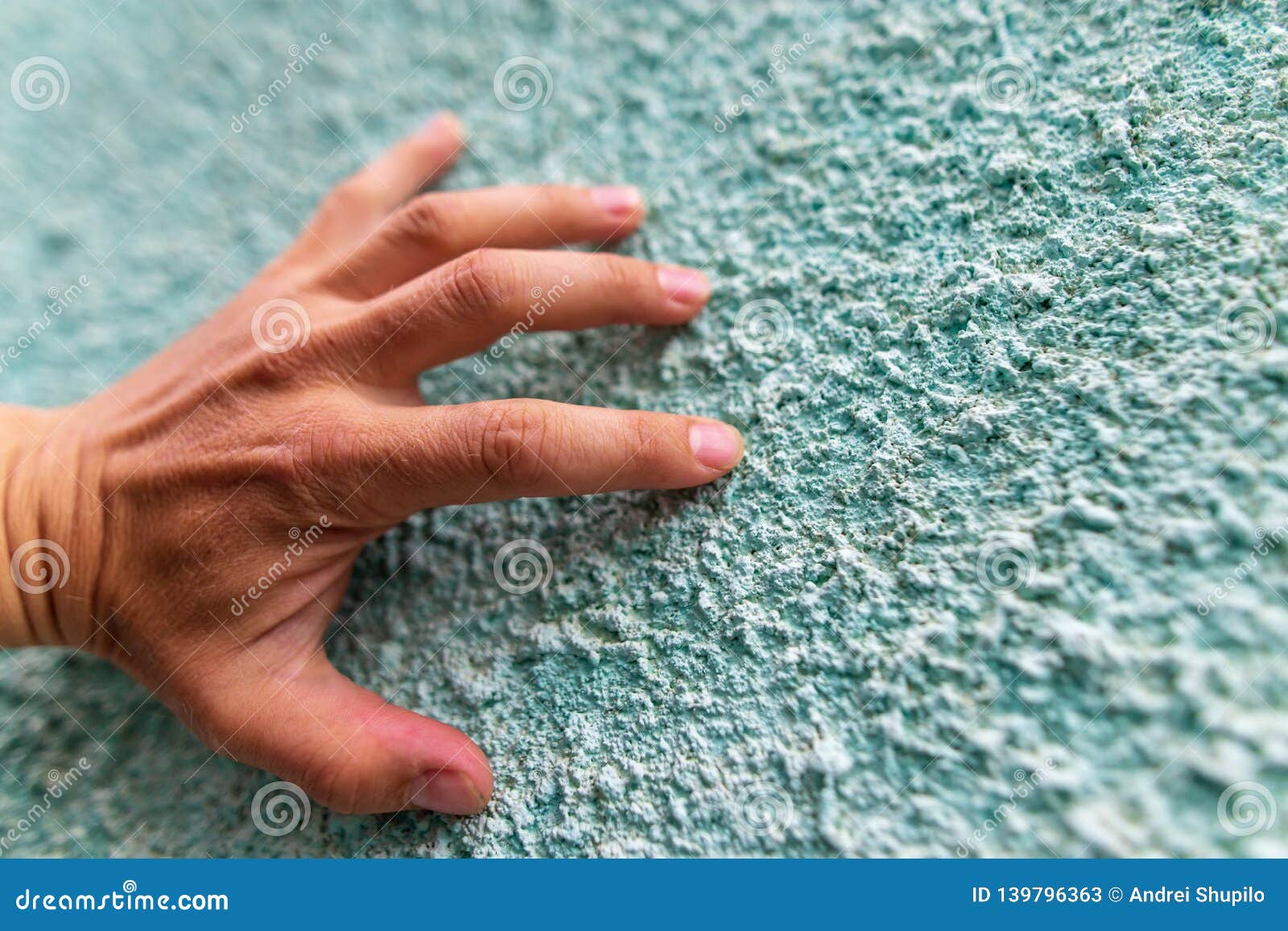 Hand on Decorative Plaster on the Wall Stock Image - Image of ...
