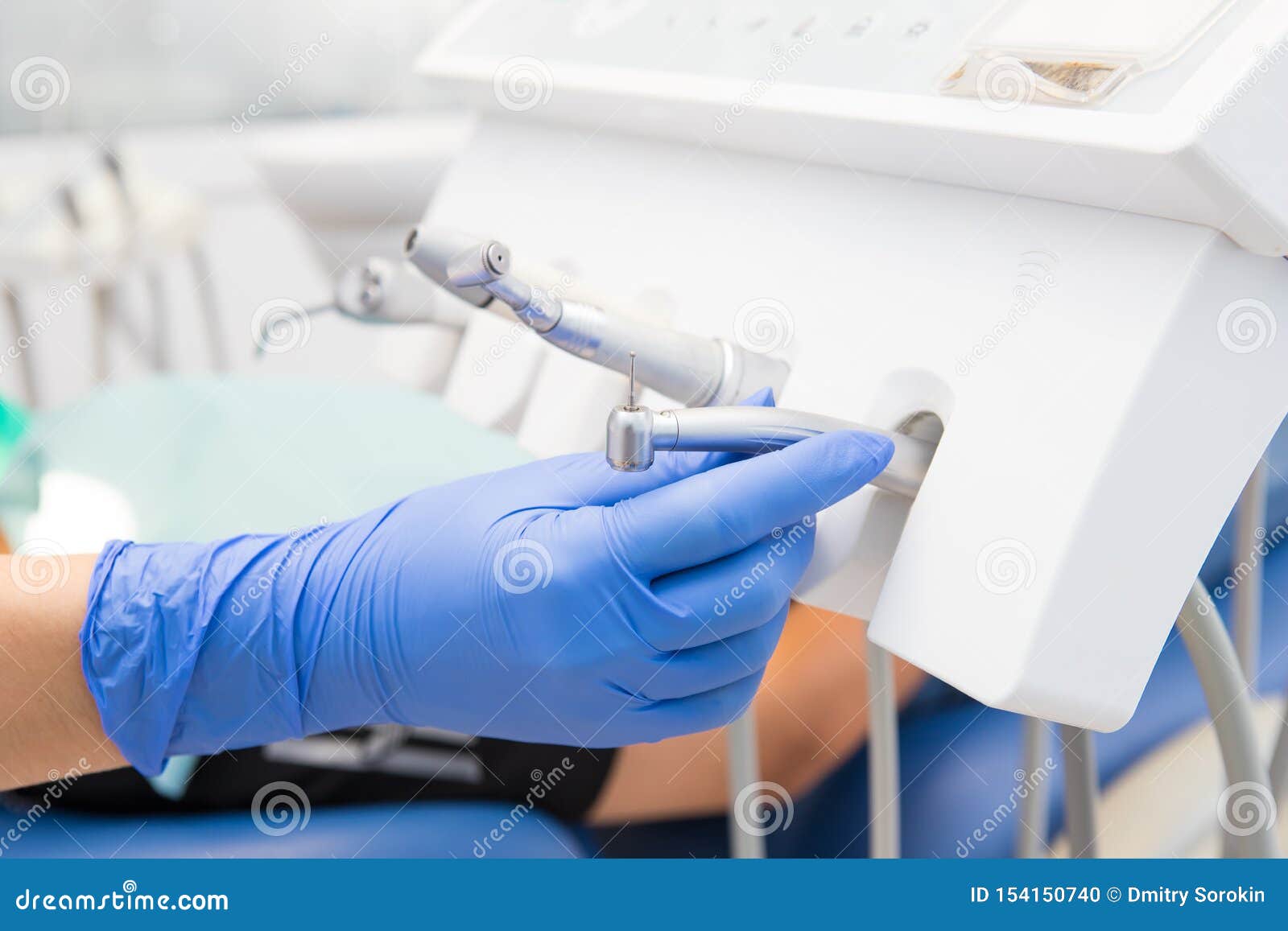 Hand of a Dentist Taking Modern Tools for Use Stock Photo - Image of ...