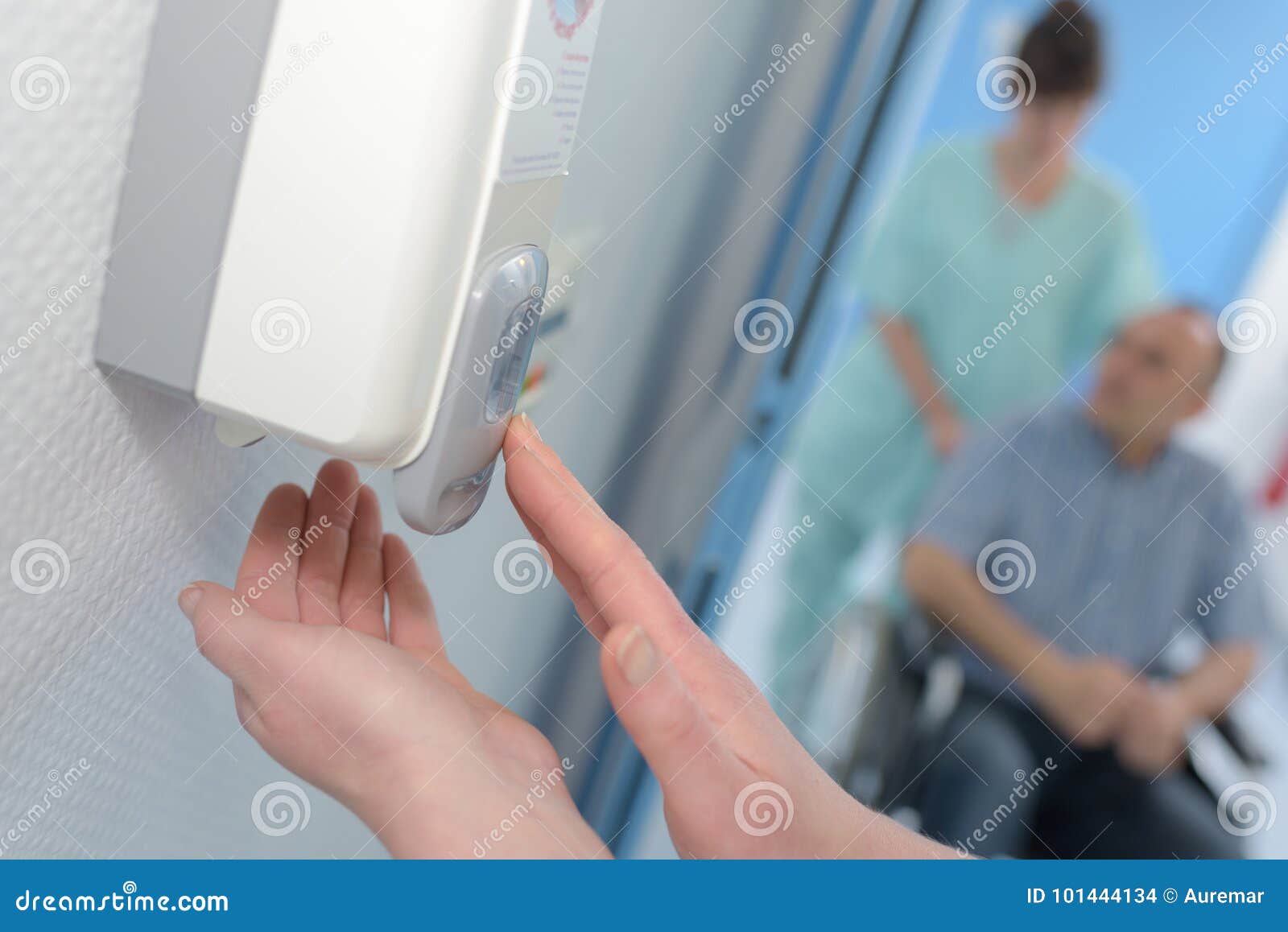 Hand dispenser in clinic stock photo. Image of person - 101444134