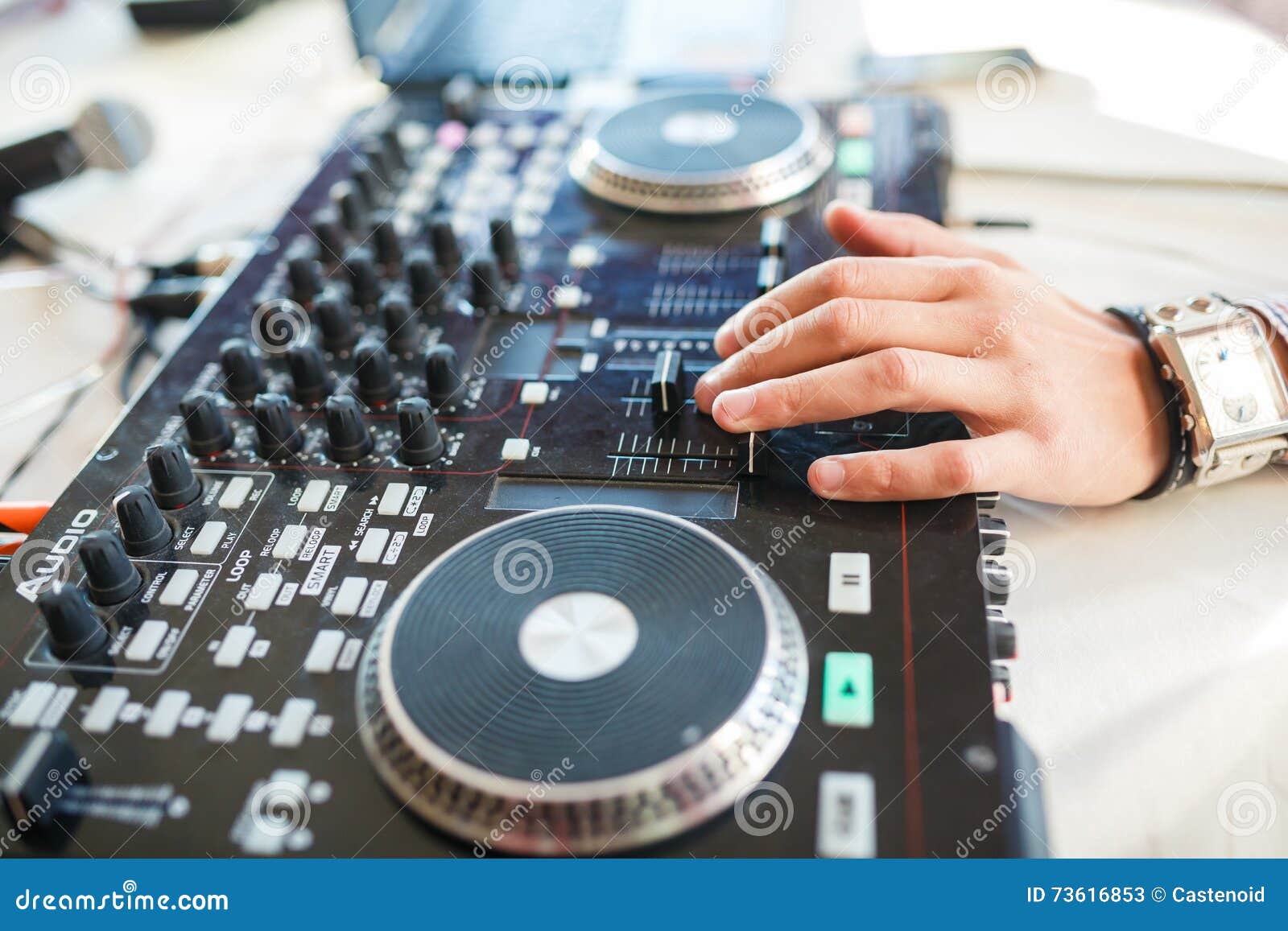 Hand of DJ on the decks stock image. Image of input, production - 73616853
