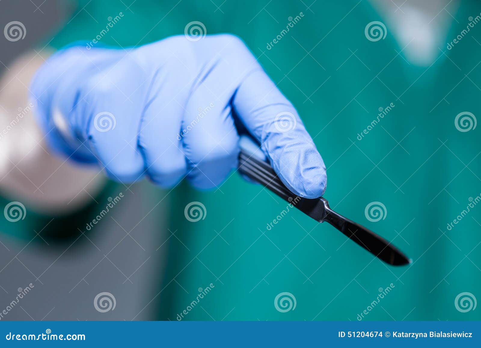 Doctor Finger Gloved Holding Up Photos - Free & Royalty-Free Stock ...