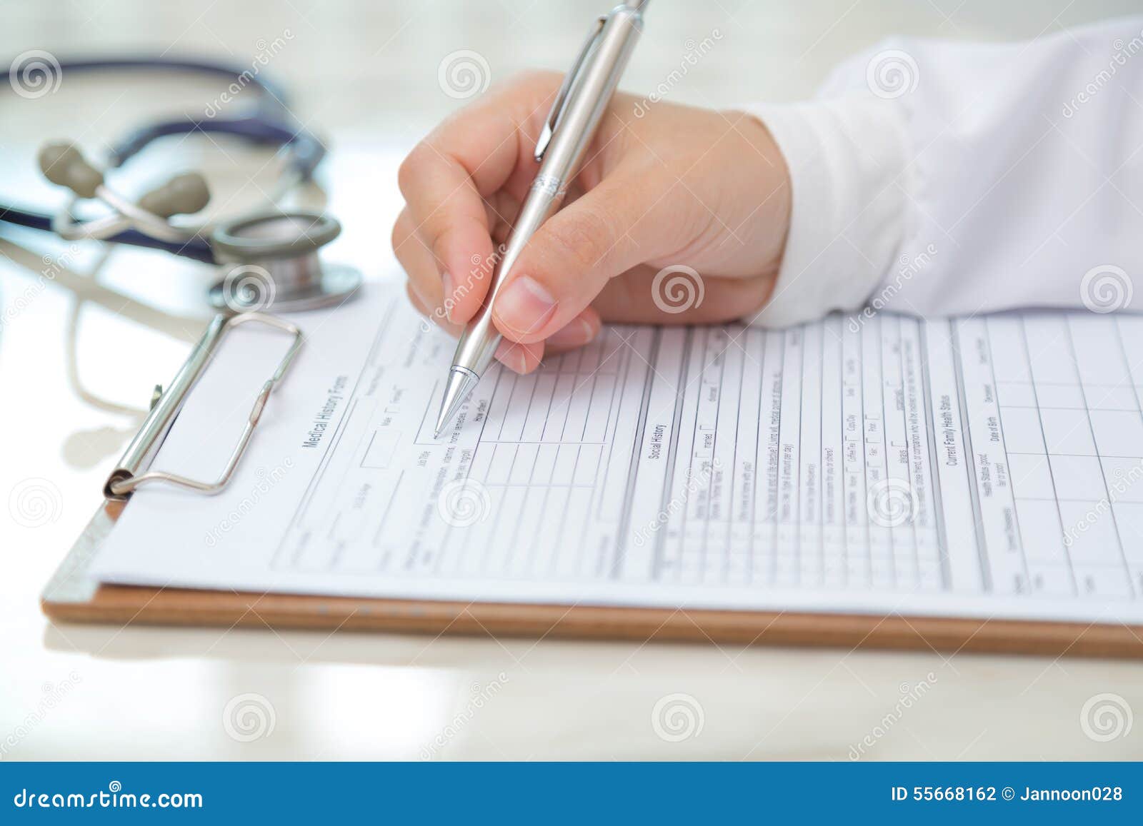 Hand of doctor writing stock photo. Image of application - 55668162