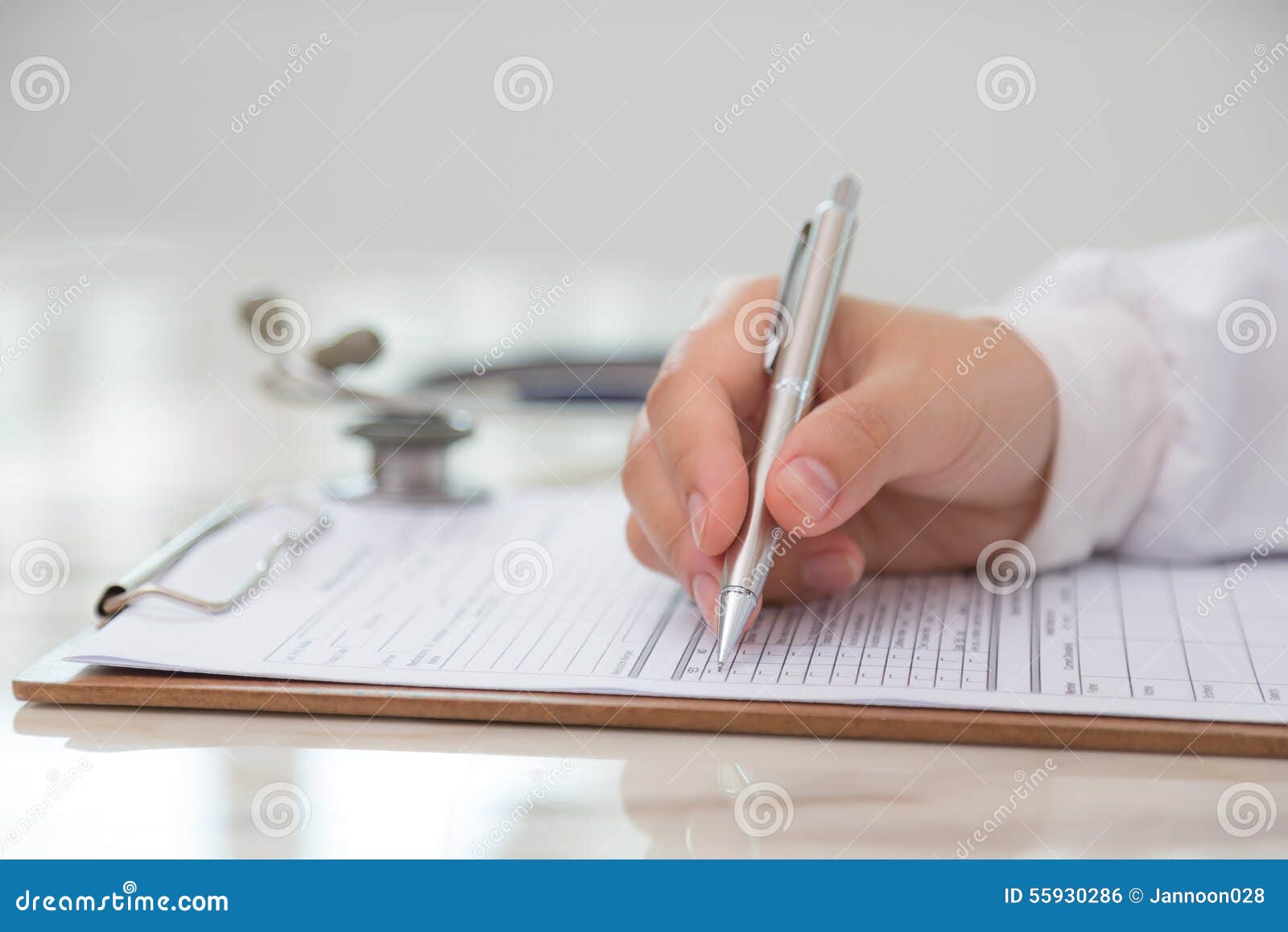 Hand of doctor writing stock photo. Image of hand, holding - 55930286