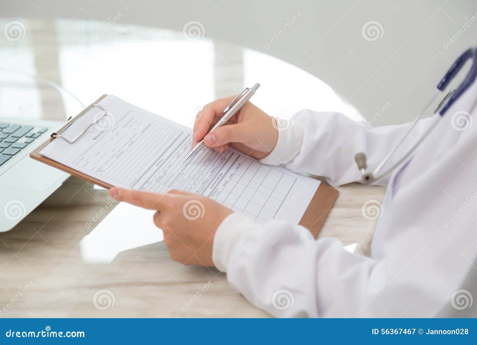 Hand of doctor writing stock image. Image of laptop, form - 56367467