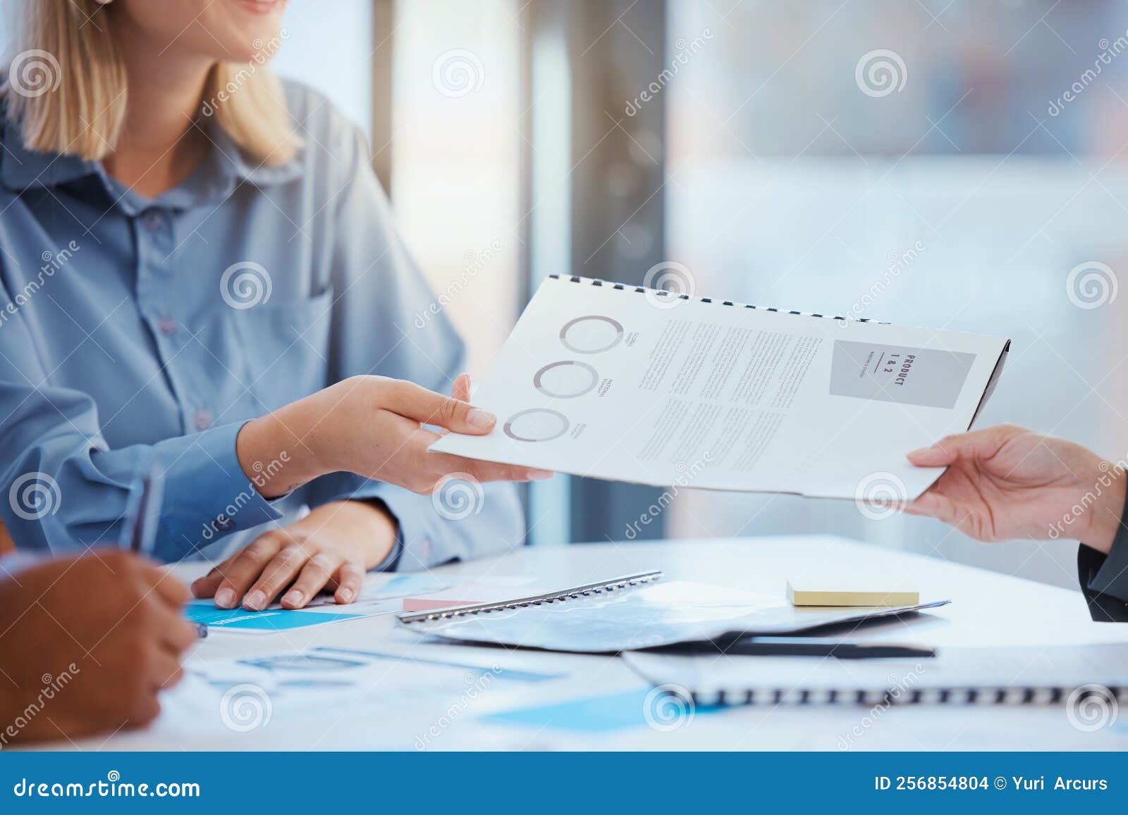 Hand, Document and Meeting with Marketing Team at a Table Reading ...