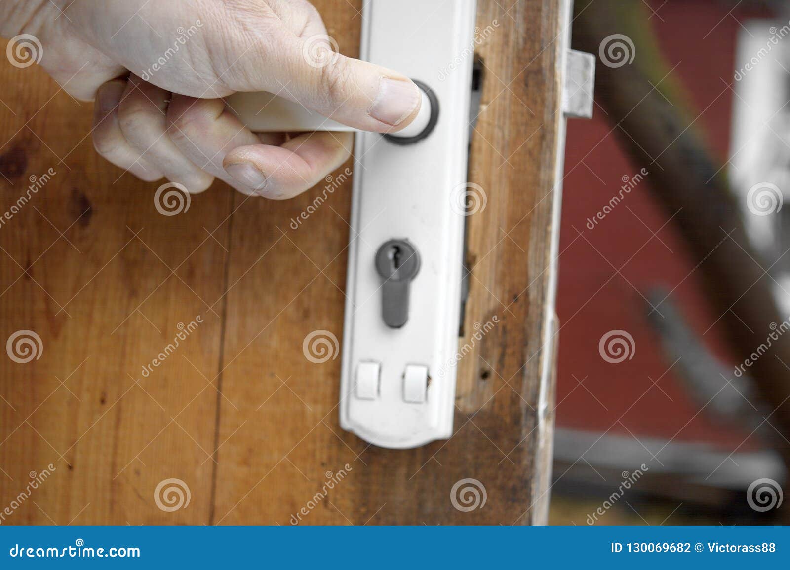 Hand on a door handle stock photo. Image of architecture - 130069682