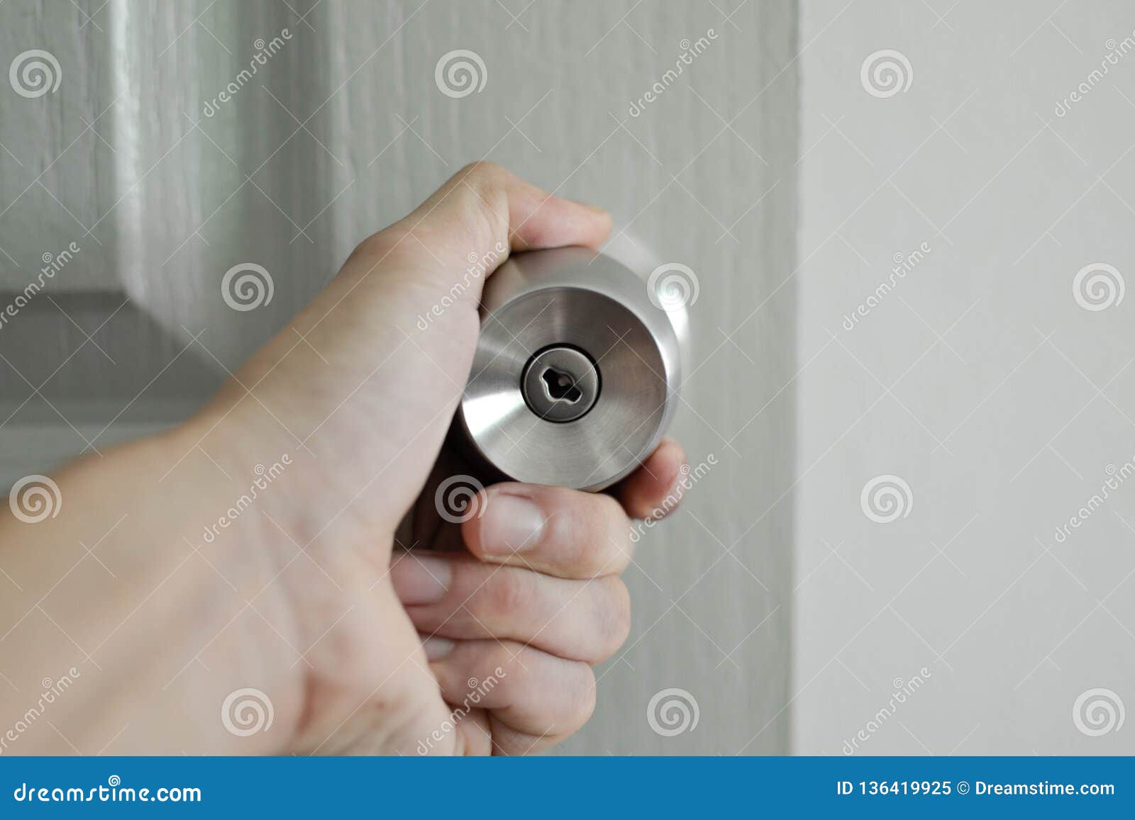 Hand on Door Knobs. Stainless Door Knob Stock Image - Image of building, door: 136419925