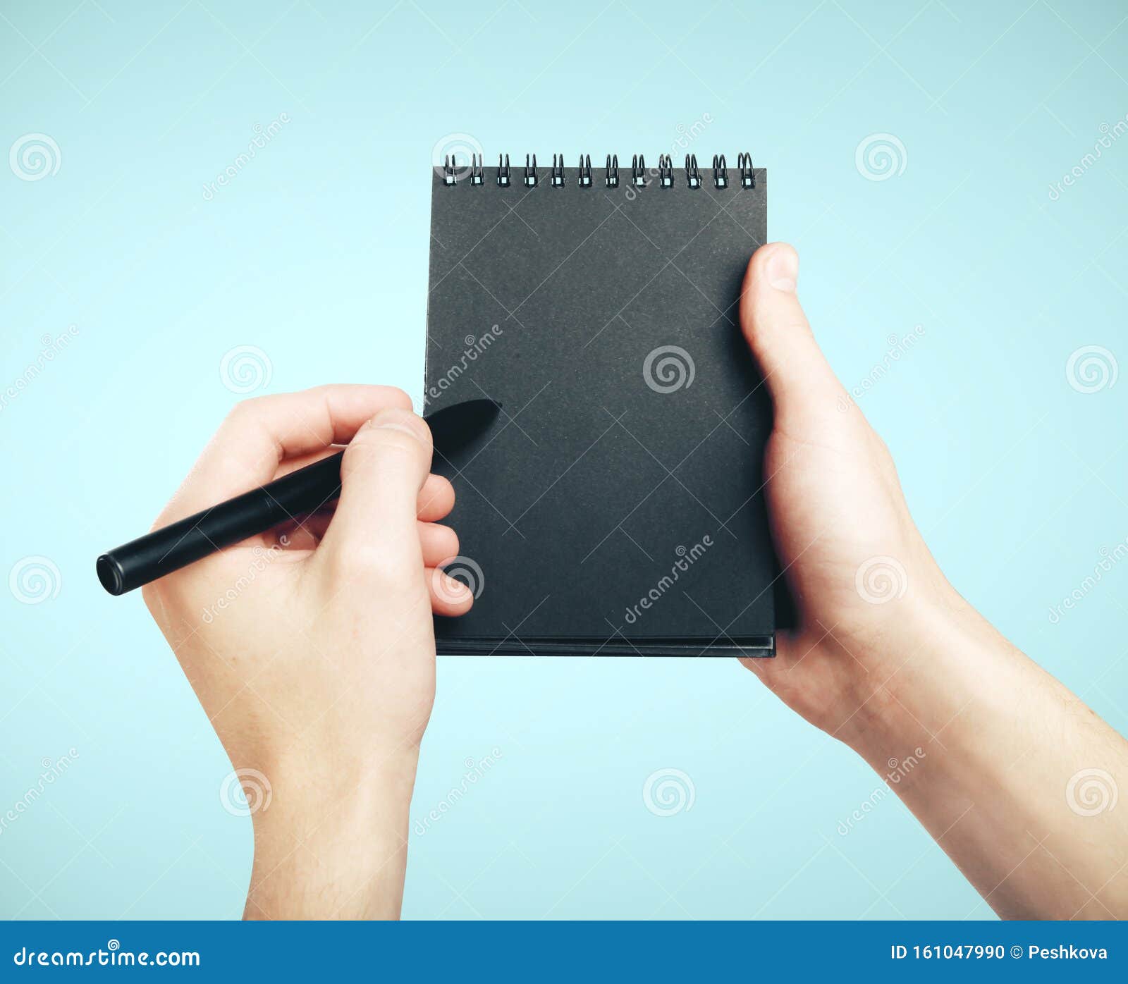 Hand drawing in notepad stock photo. Image of assignment - 161047990
