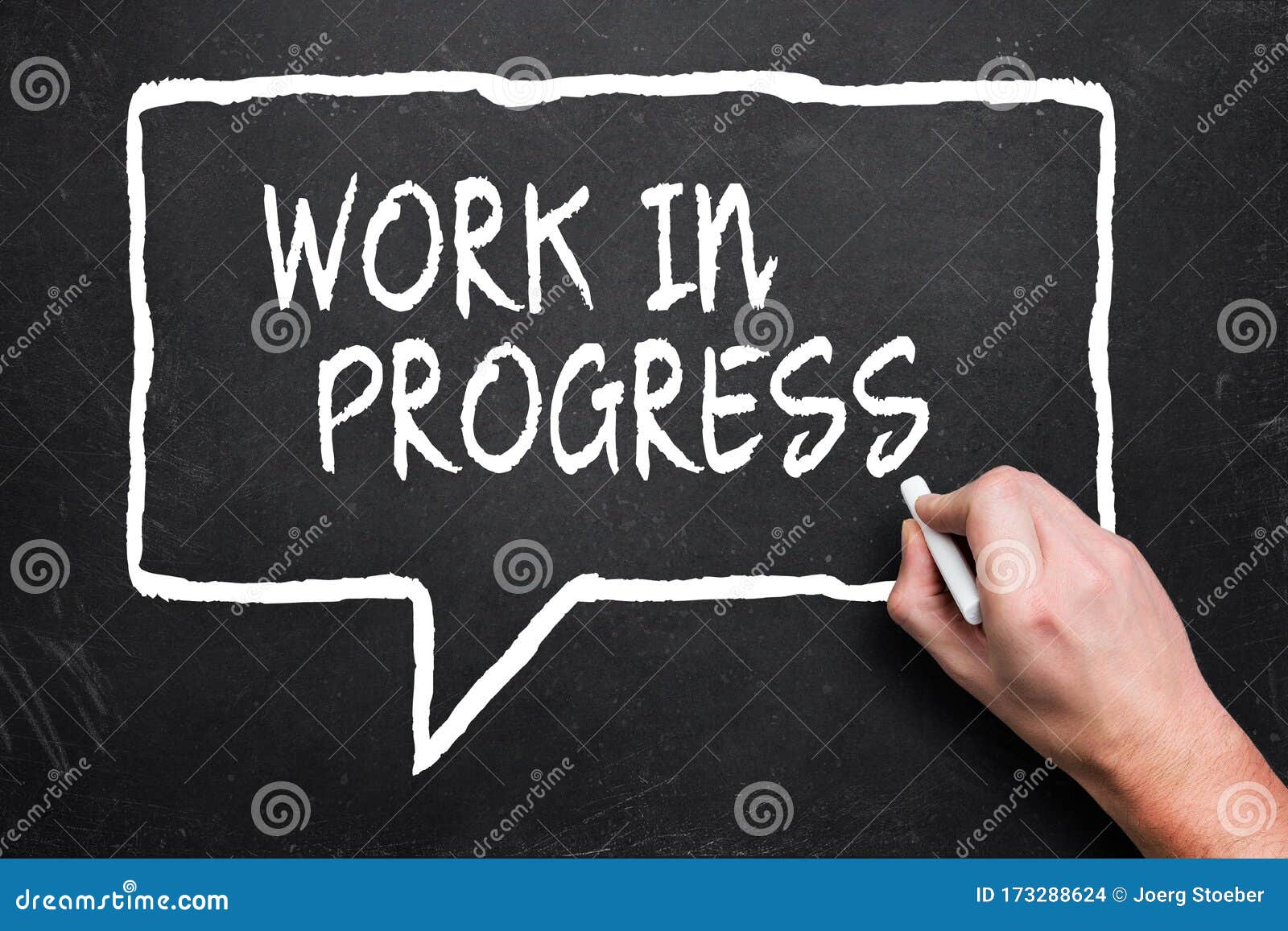 Hand is Drawing Speech Bubble with Text WORK in PROGRESS Stock Photo ...