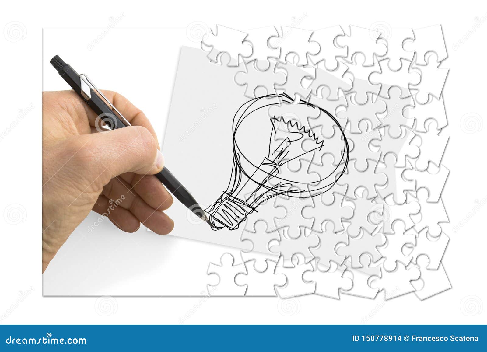 Hand Draws a Light Bulb with a Pencil on a Sheet - Concept Image in ...
