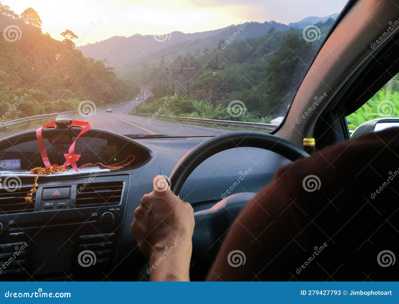 Hand Driving a Car on the Road Blurred Background Stock Image - Image ...