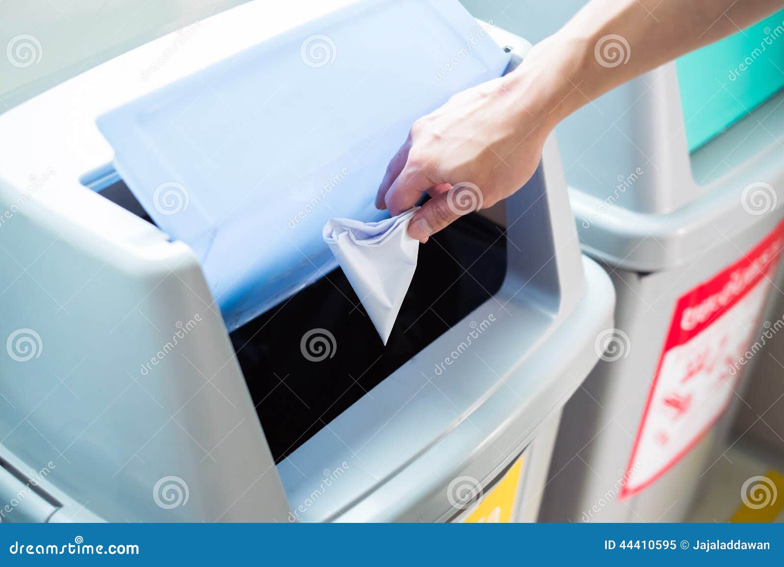 Hand Dropping Crumpled Paper Stock Image - Image of recycle, clean ...